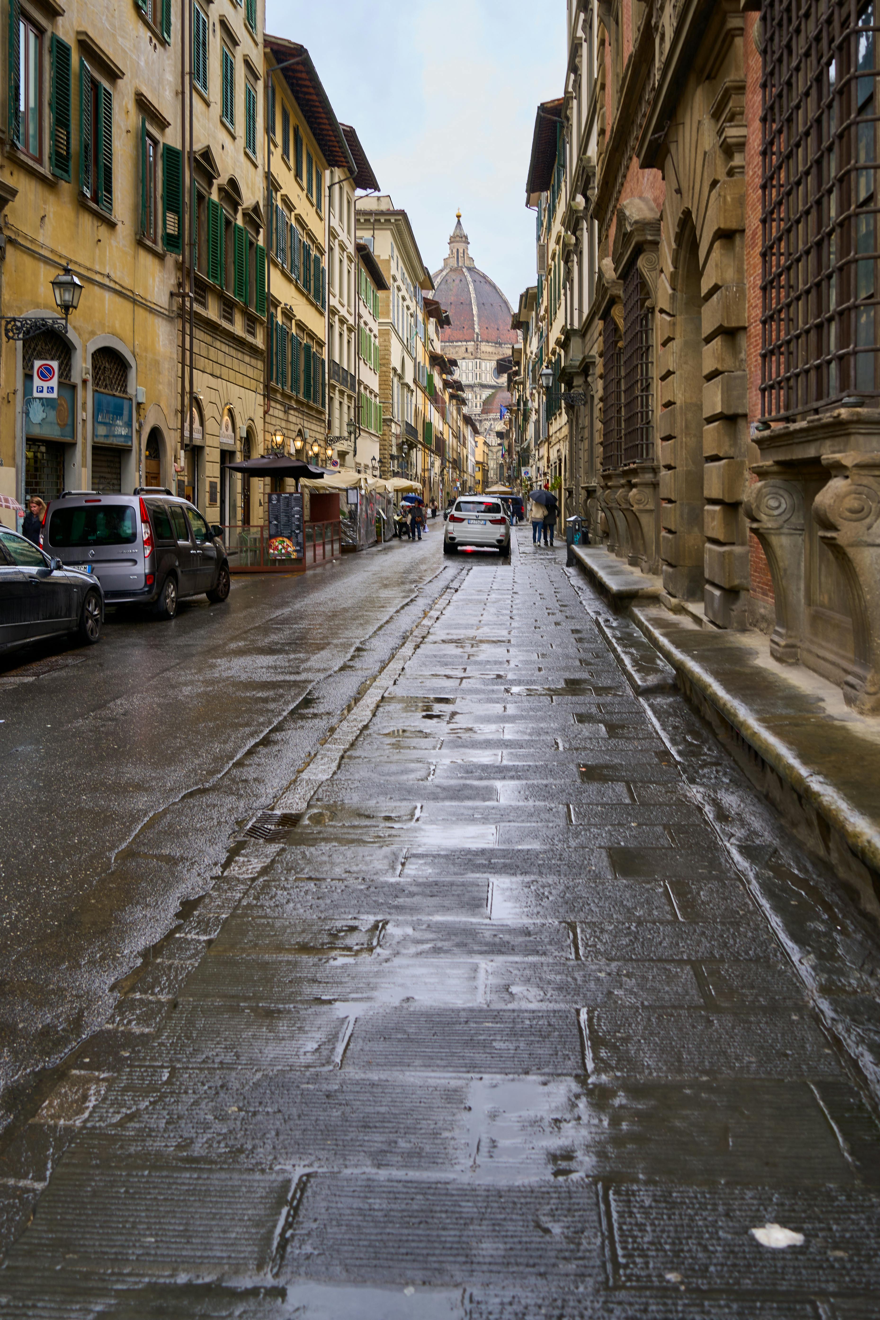 Rainy Street Leading to Florence Cathedral Dome · Free Stock Photo