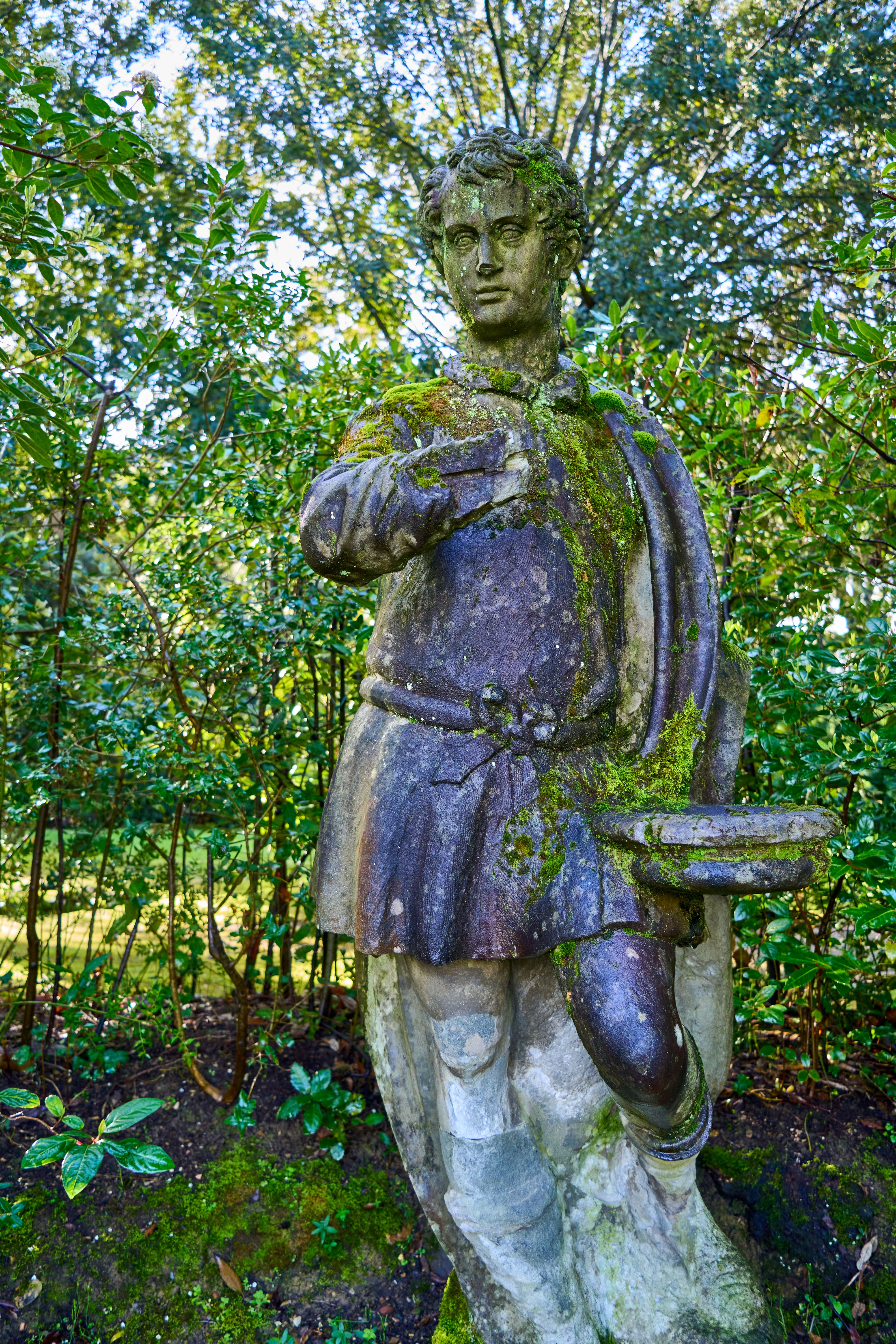 Historic Moss-Covered Garden Statue · Free Stock Photo