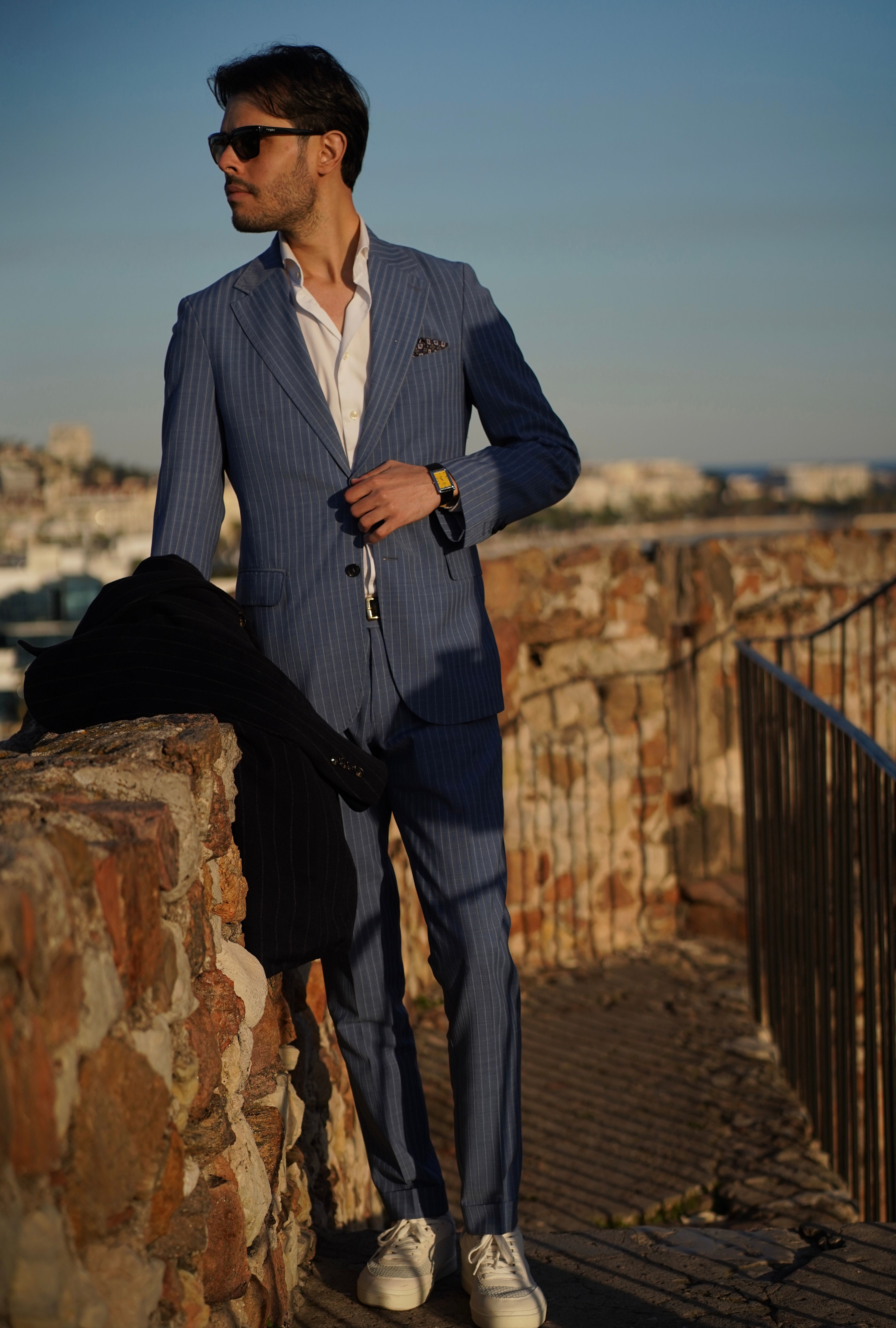 Stylish Man in Blue Suit Enjoys Sunset View · Free Stock Photo