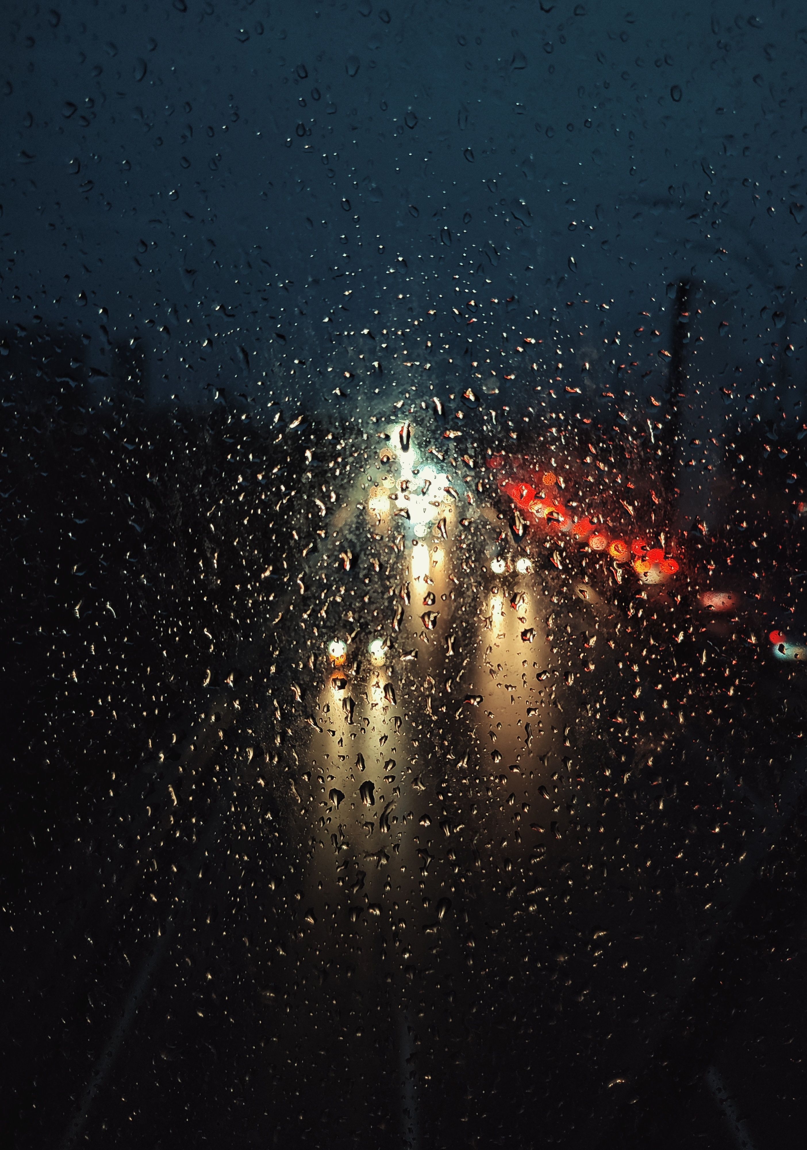 Rainy Night Traffic Seen Through Window · Free Stock Photo