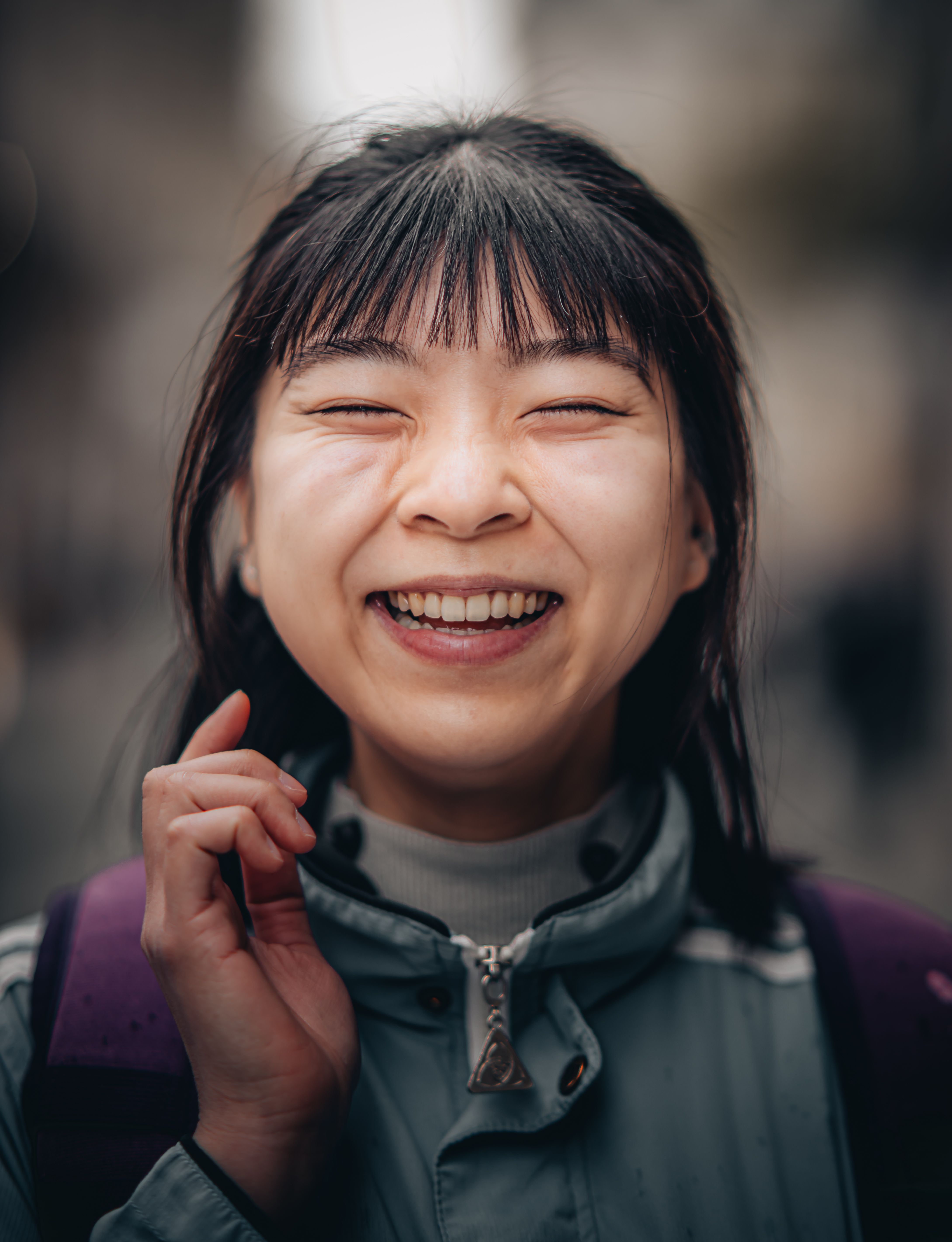 Joyful Woman Laughing Outdoors in Winter Daytime · Free Stock Photo