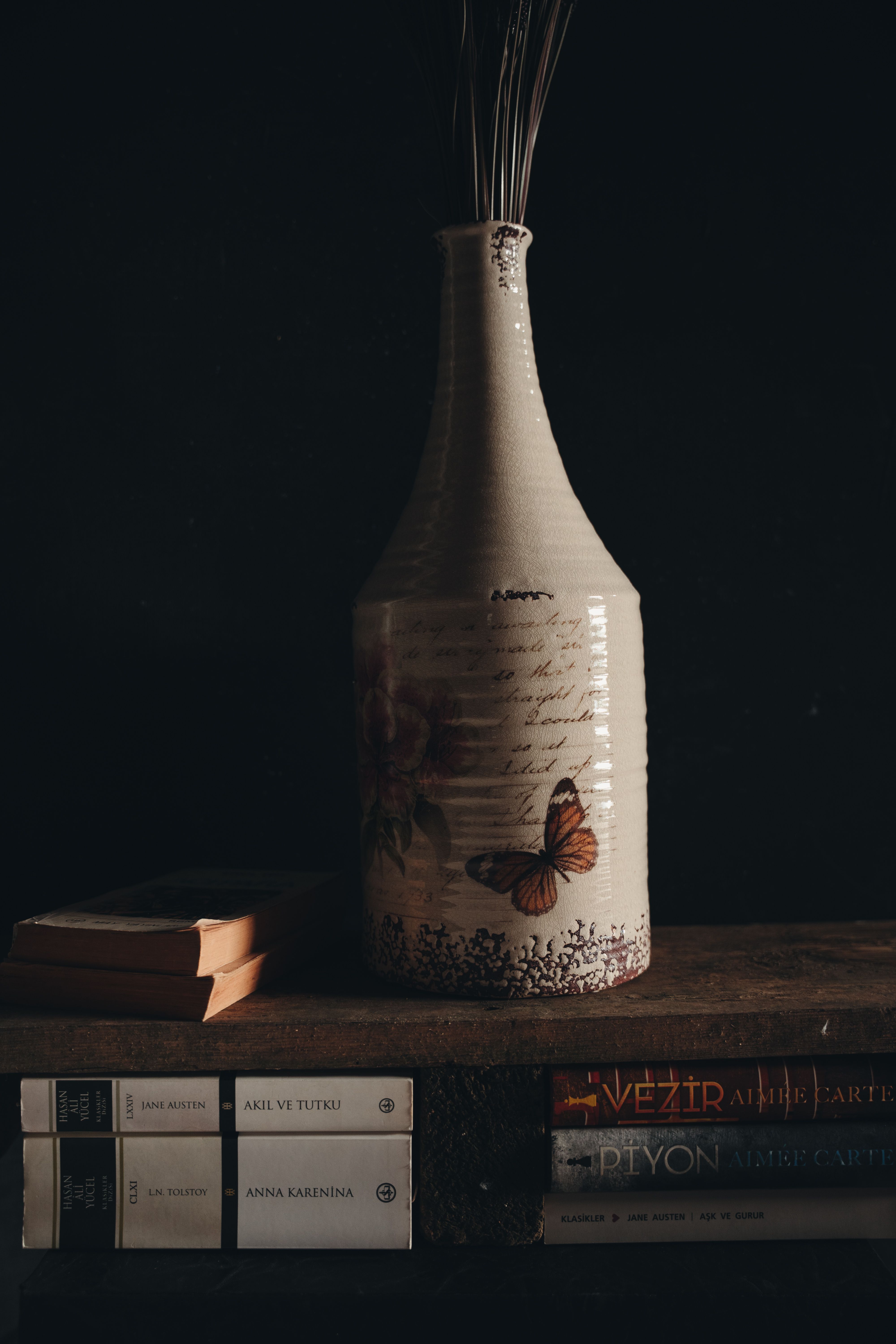 Vintage Vase with Books on Rustic Wooden Shelf · Free Stock Photo