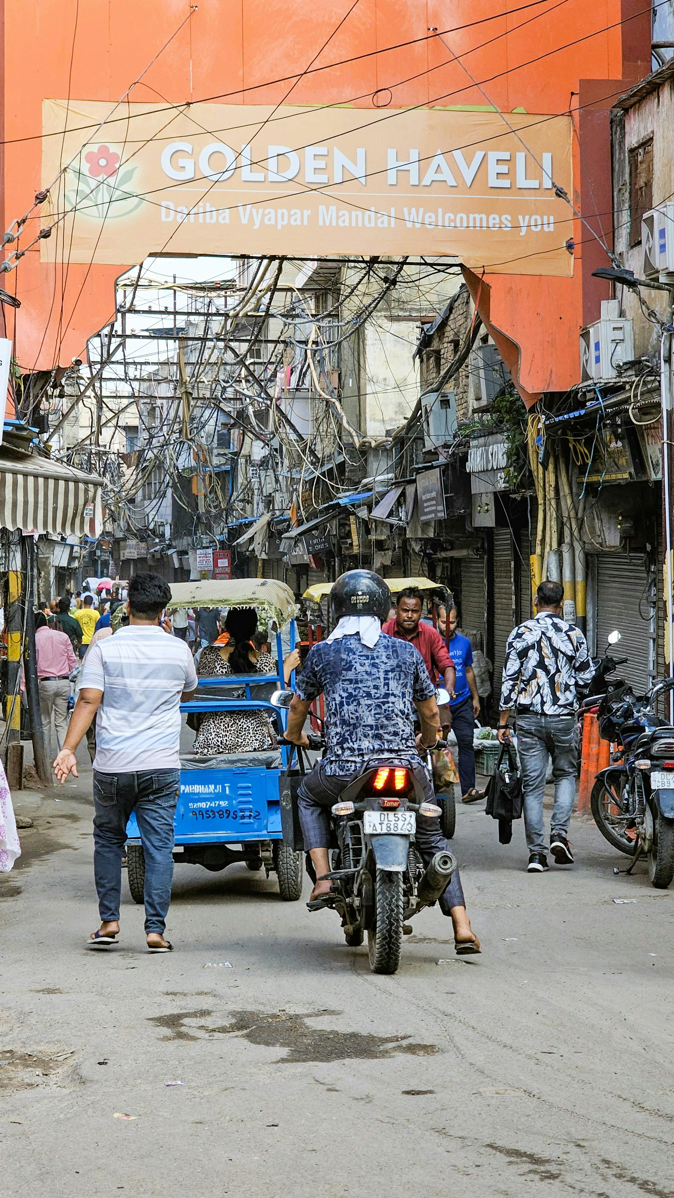Bustling Street Scene at Delhi's Golden Haveli · Free Stock Photo