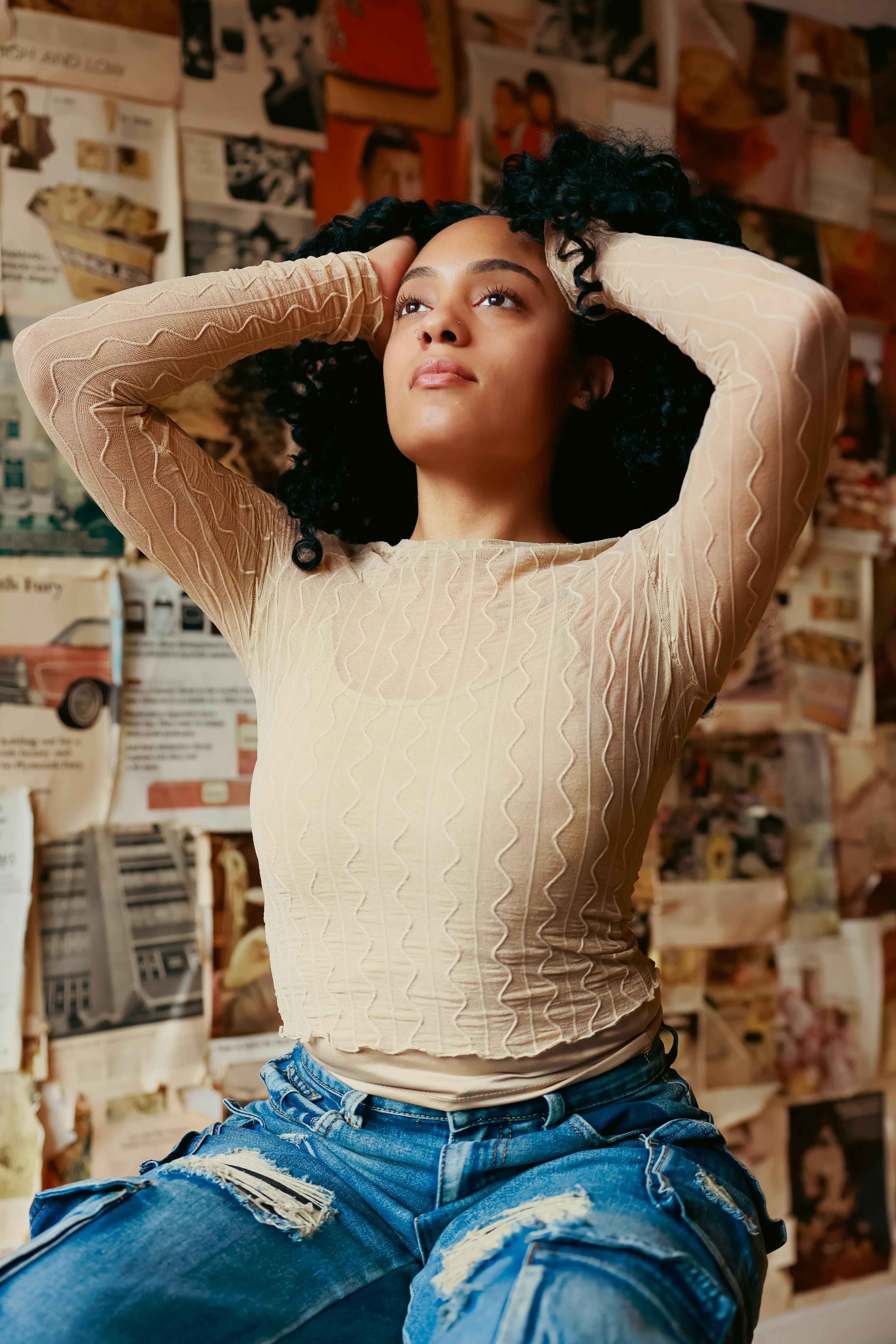 Woman Posing Indoors with Vintage Background · Free Stock Photo