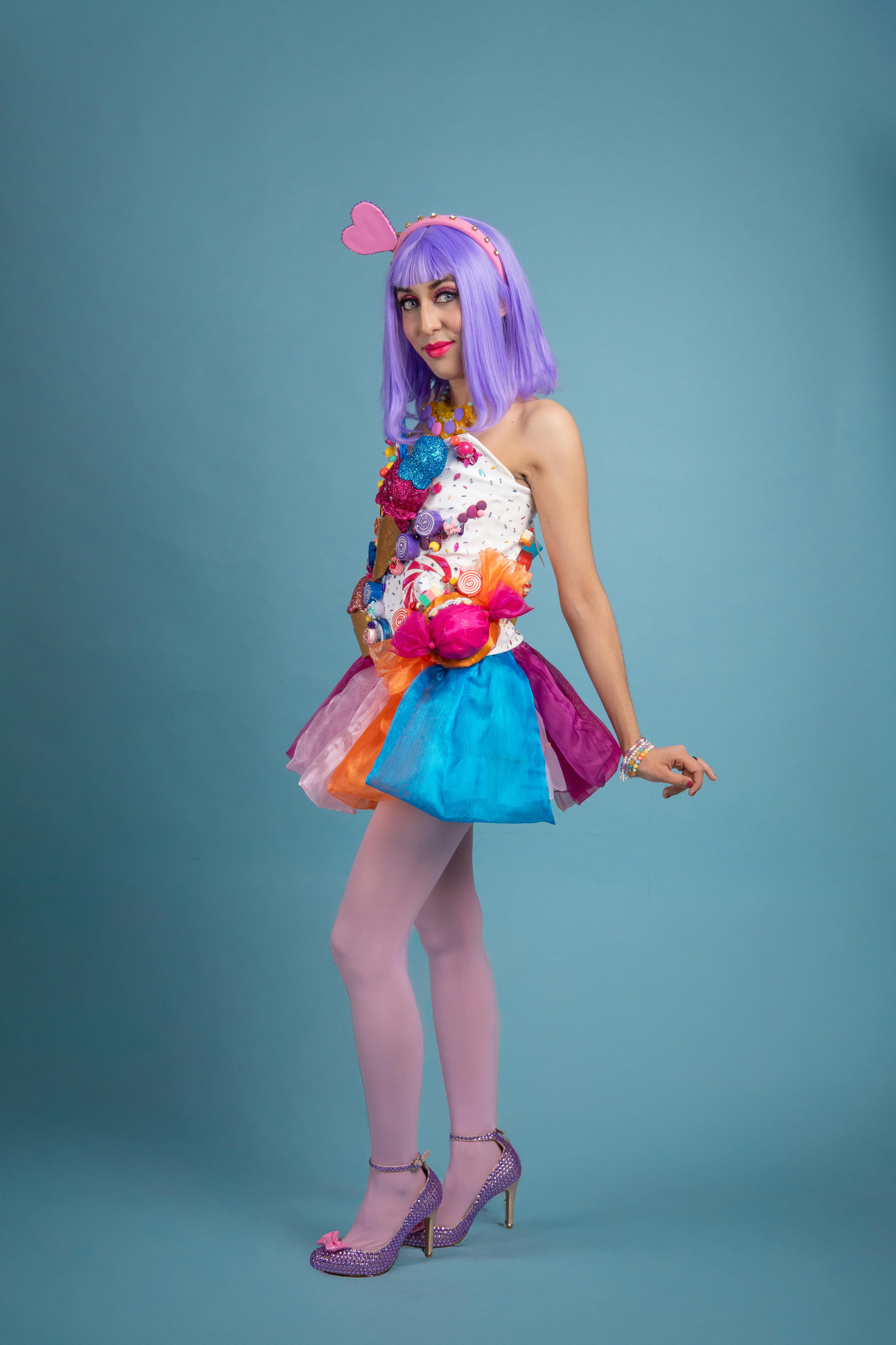 Colorful Cosplay Costume on Blue Background · Free Stock Photo