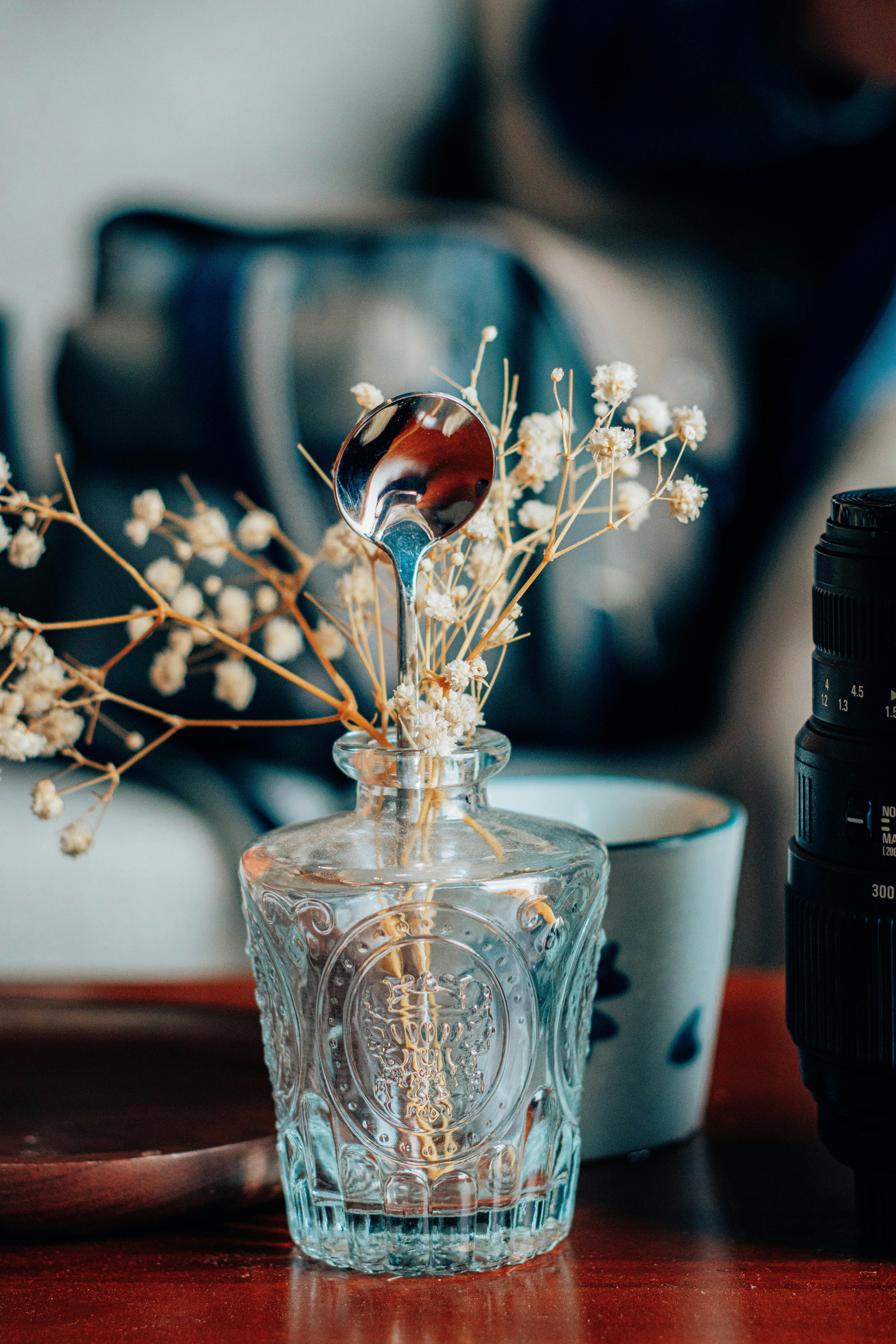 Elegant Crystal Vase with Dried Flowers on Table · Free Stock Photo