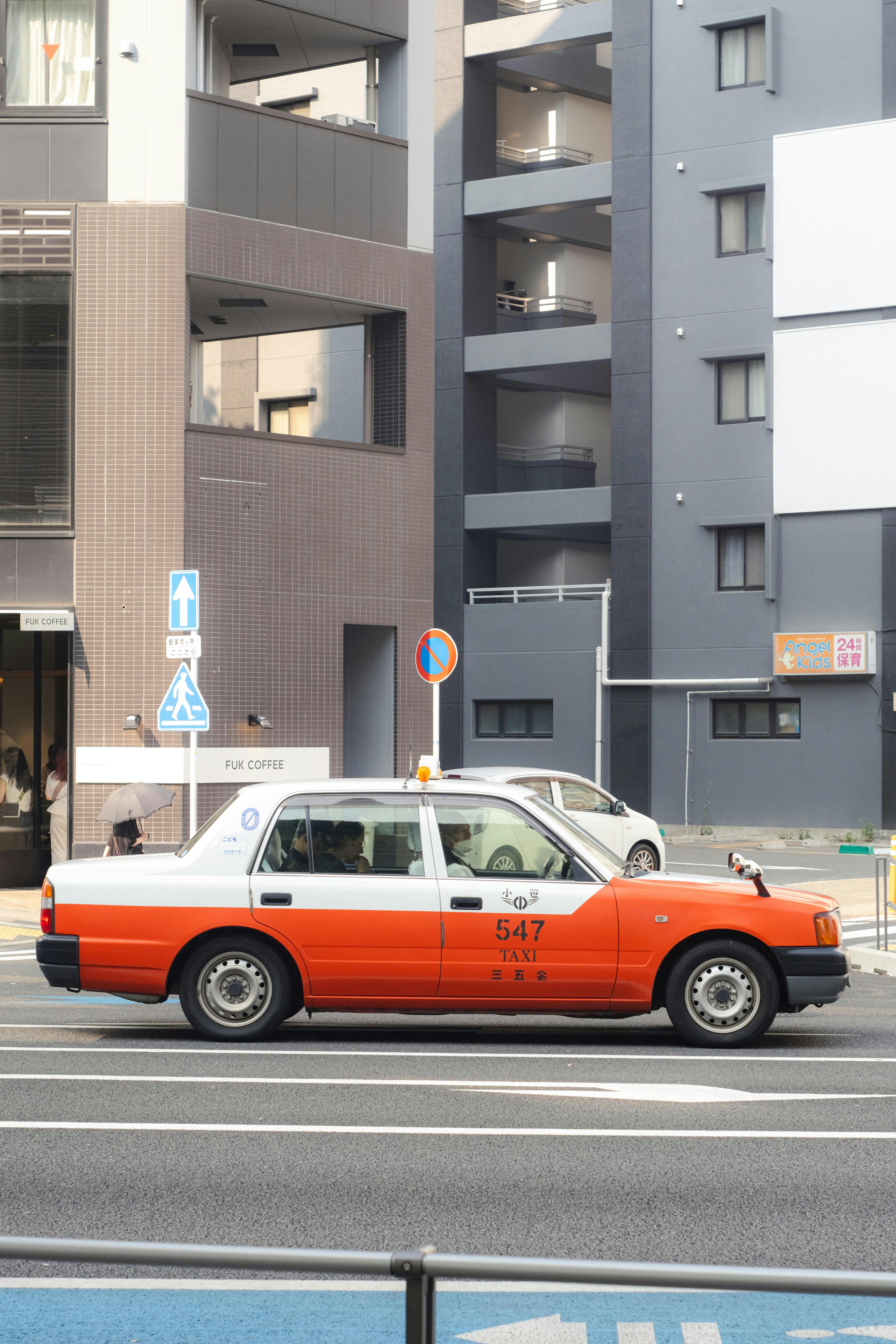 Traditional Japanese Taxi on Fukuoka Street · Free Stock Photo
