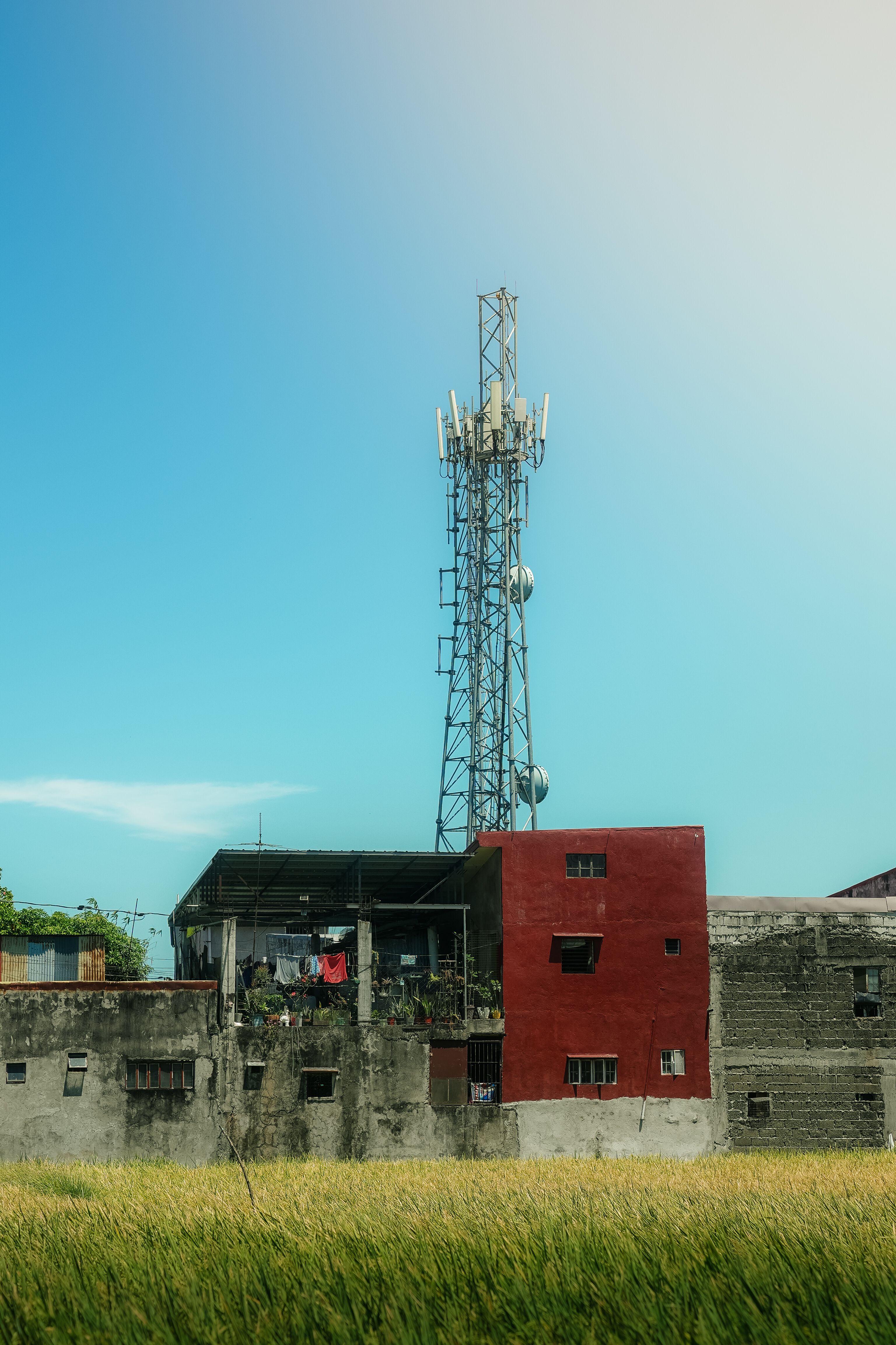 Urban Cellular Tower Against Clear Sky · Free Stock Photo