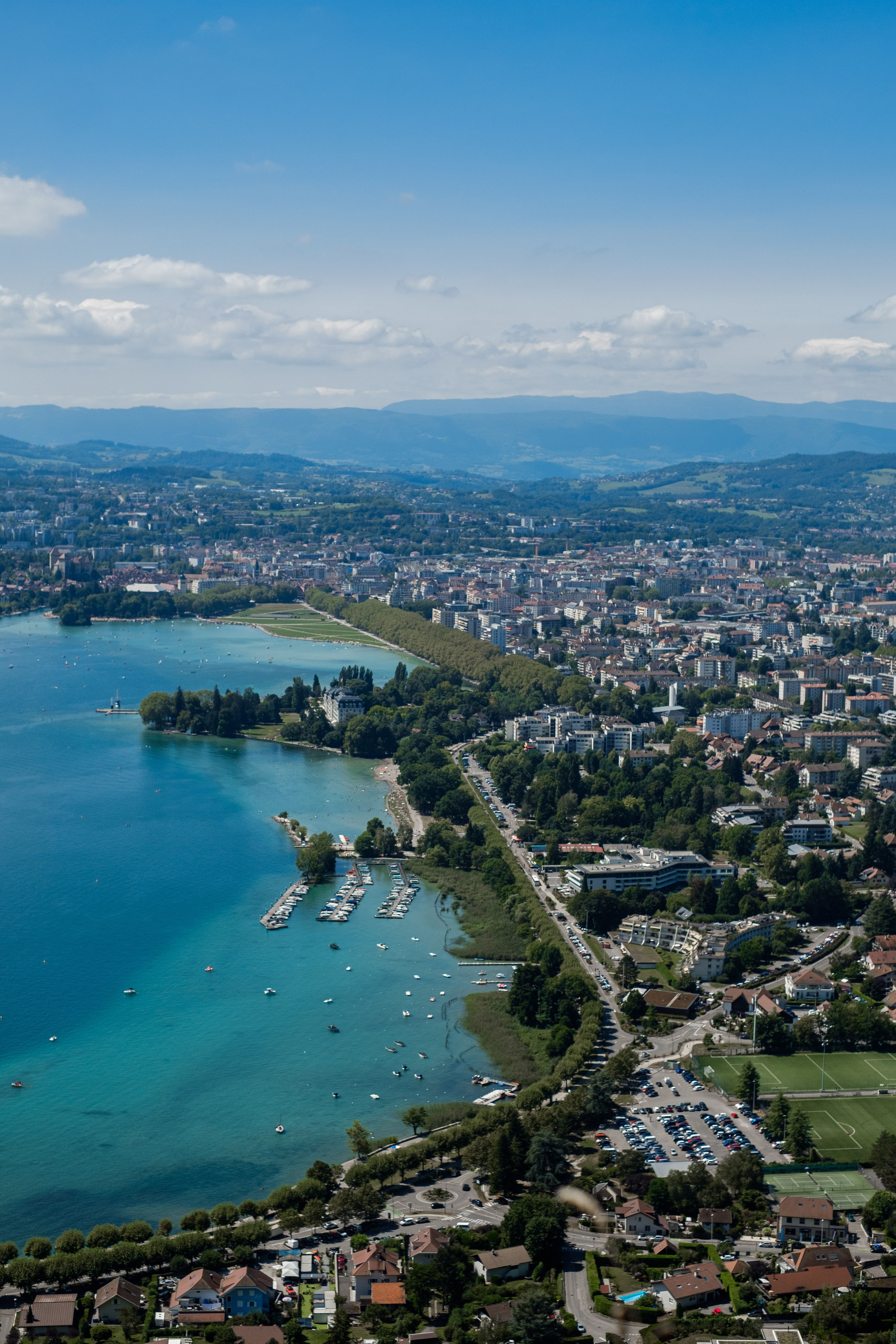 Aerial View of Cityscape and Lake Geneva Shoreline · Free Stock Photo