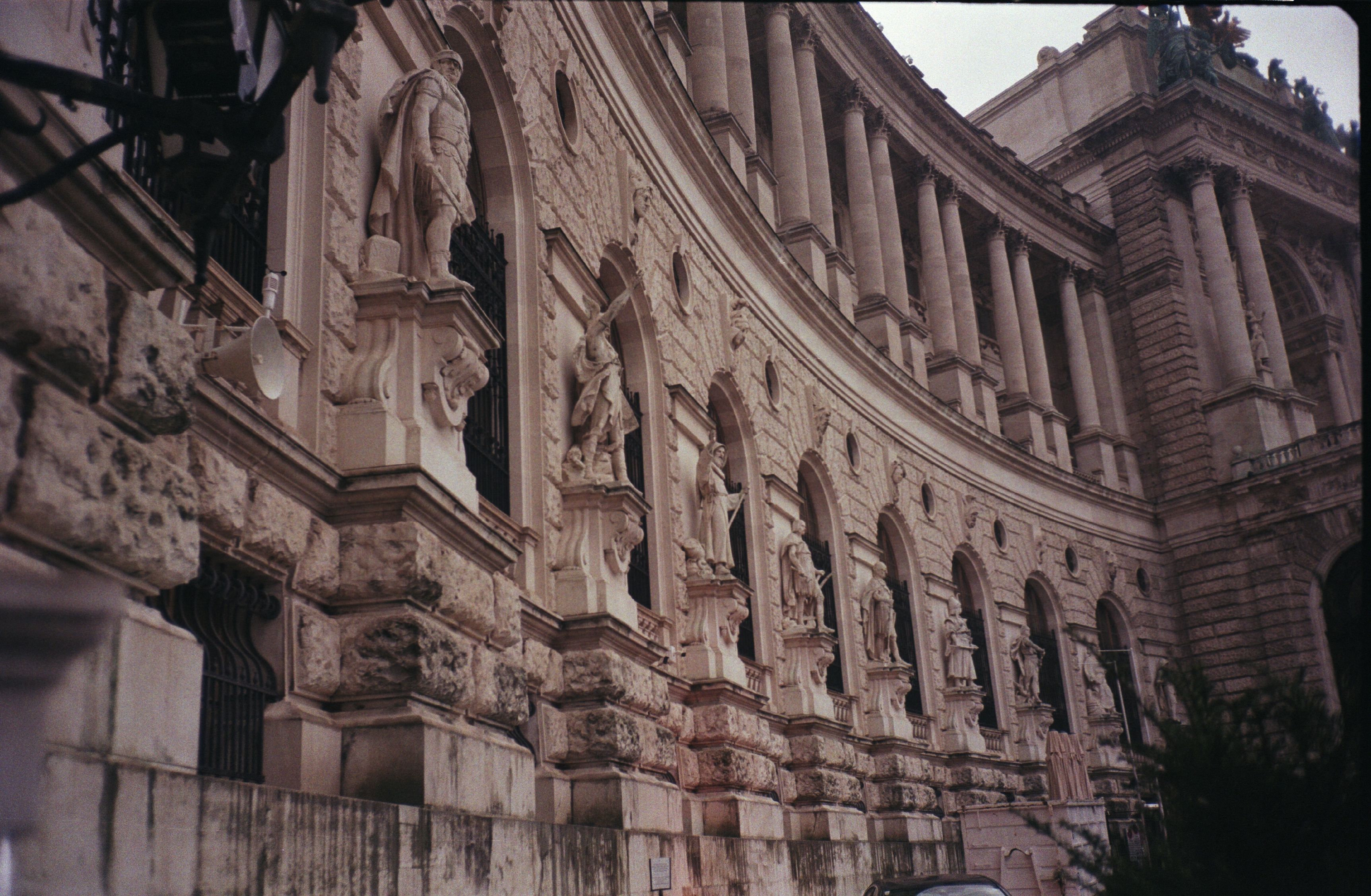 Historic European Stone Facade with Sculptures · Free Stock Photo