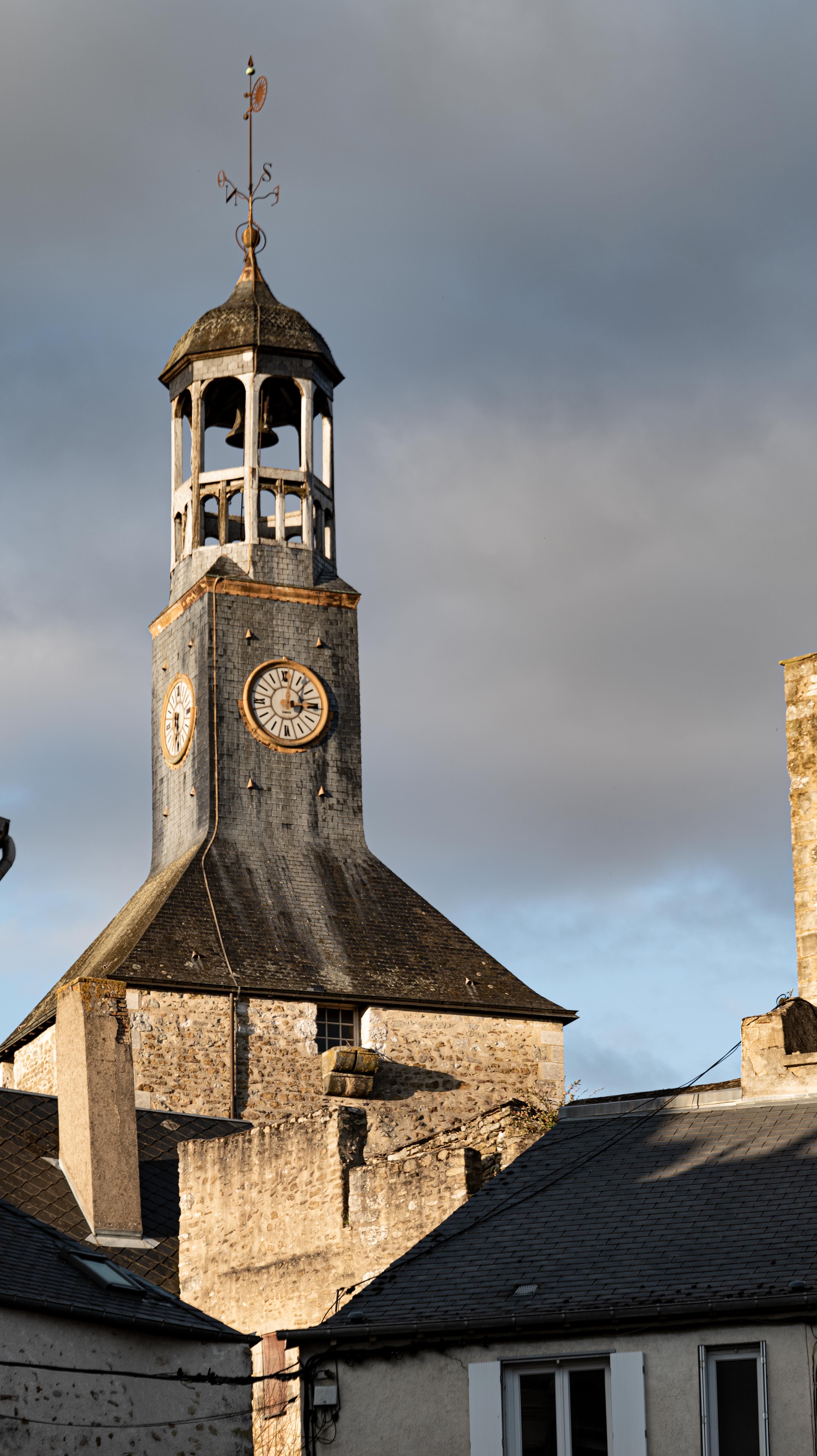 Historic European Clock Tower Against Cloudy Sky · Free Stock Photo