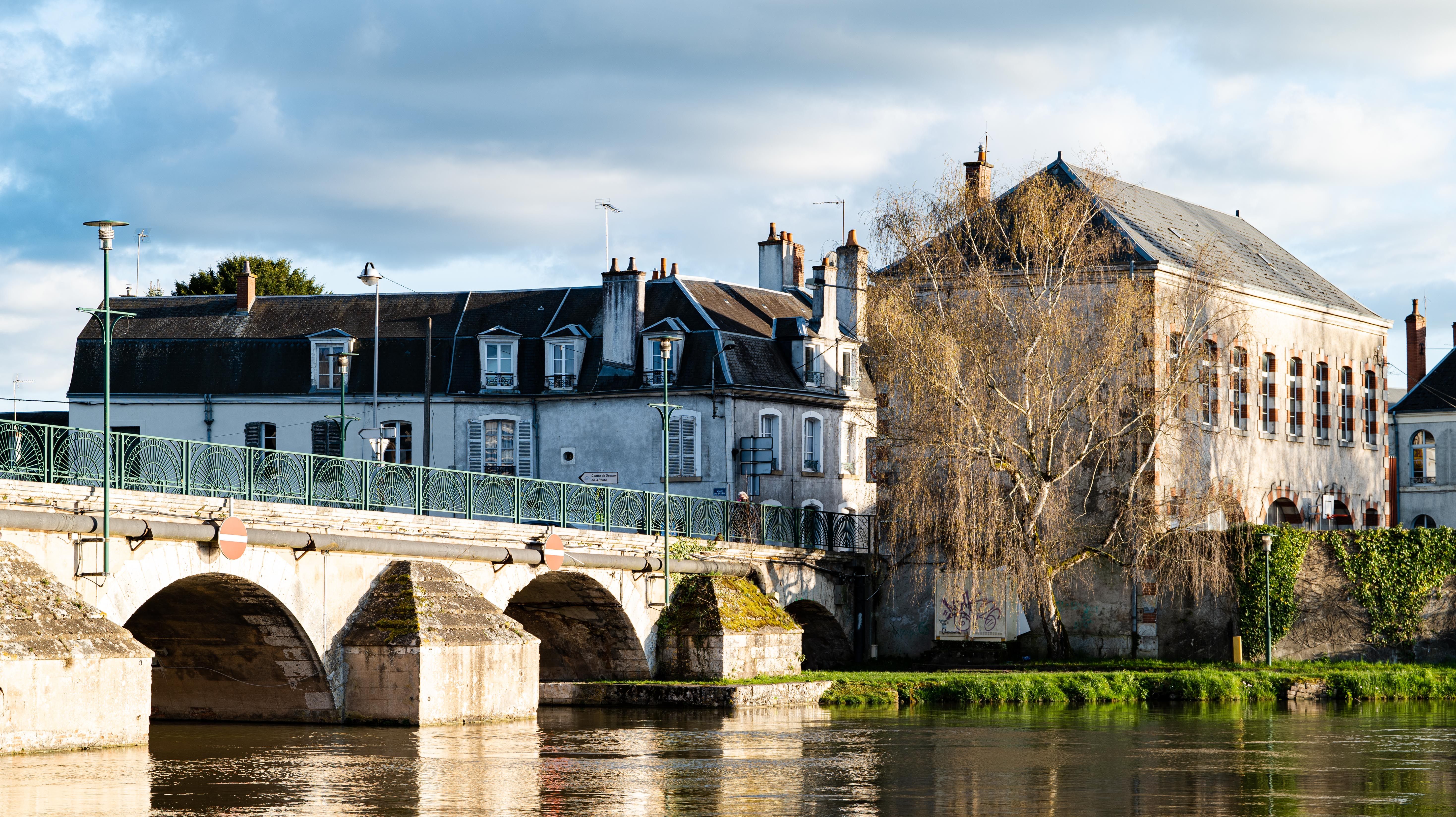 Charming French Town Bridge Over River · Free Stock Photo