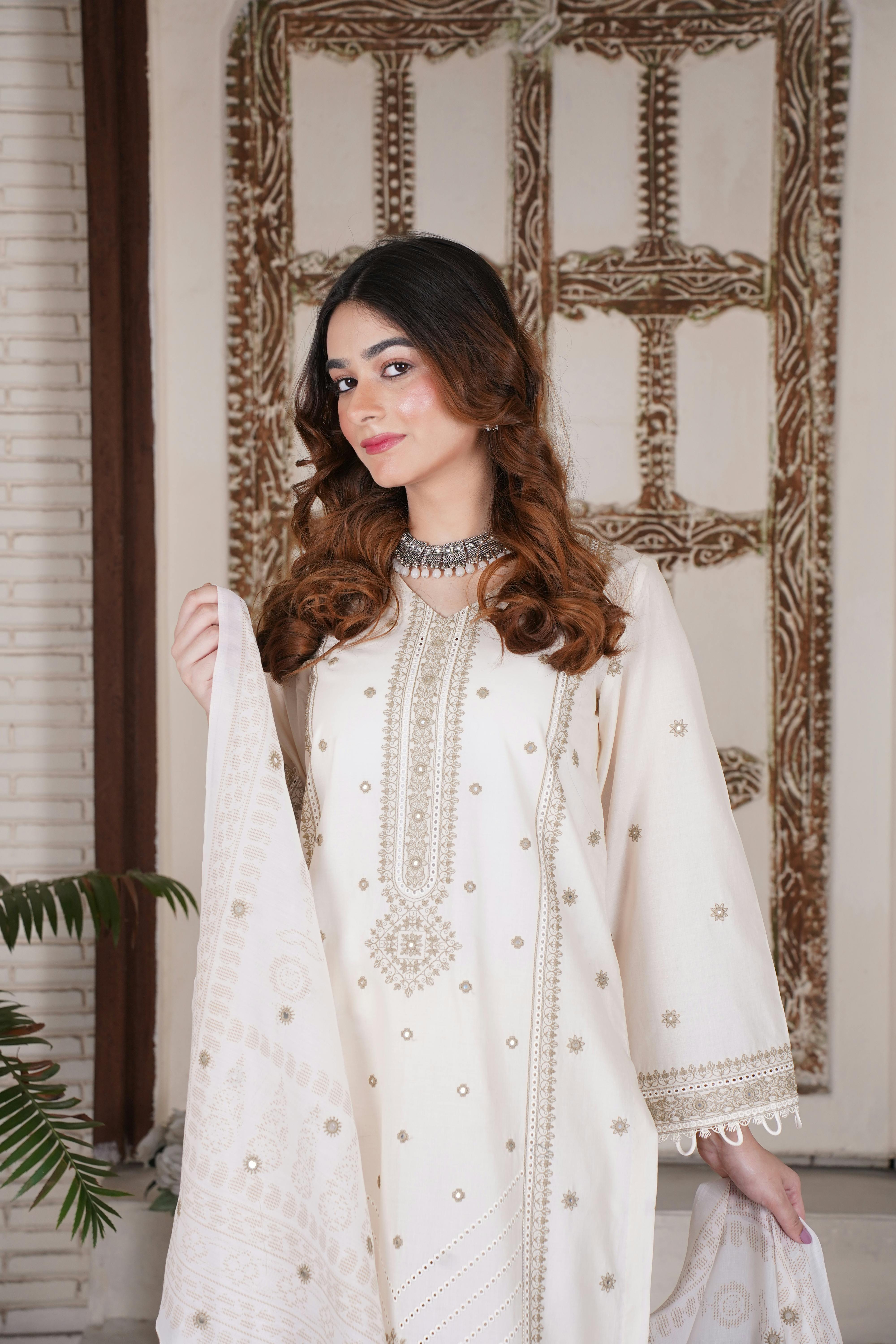 Elegant Pakistani Fashion Model in Floral Dress · Free Stock Photo