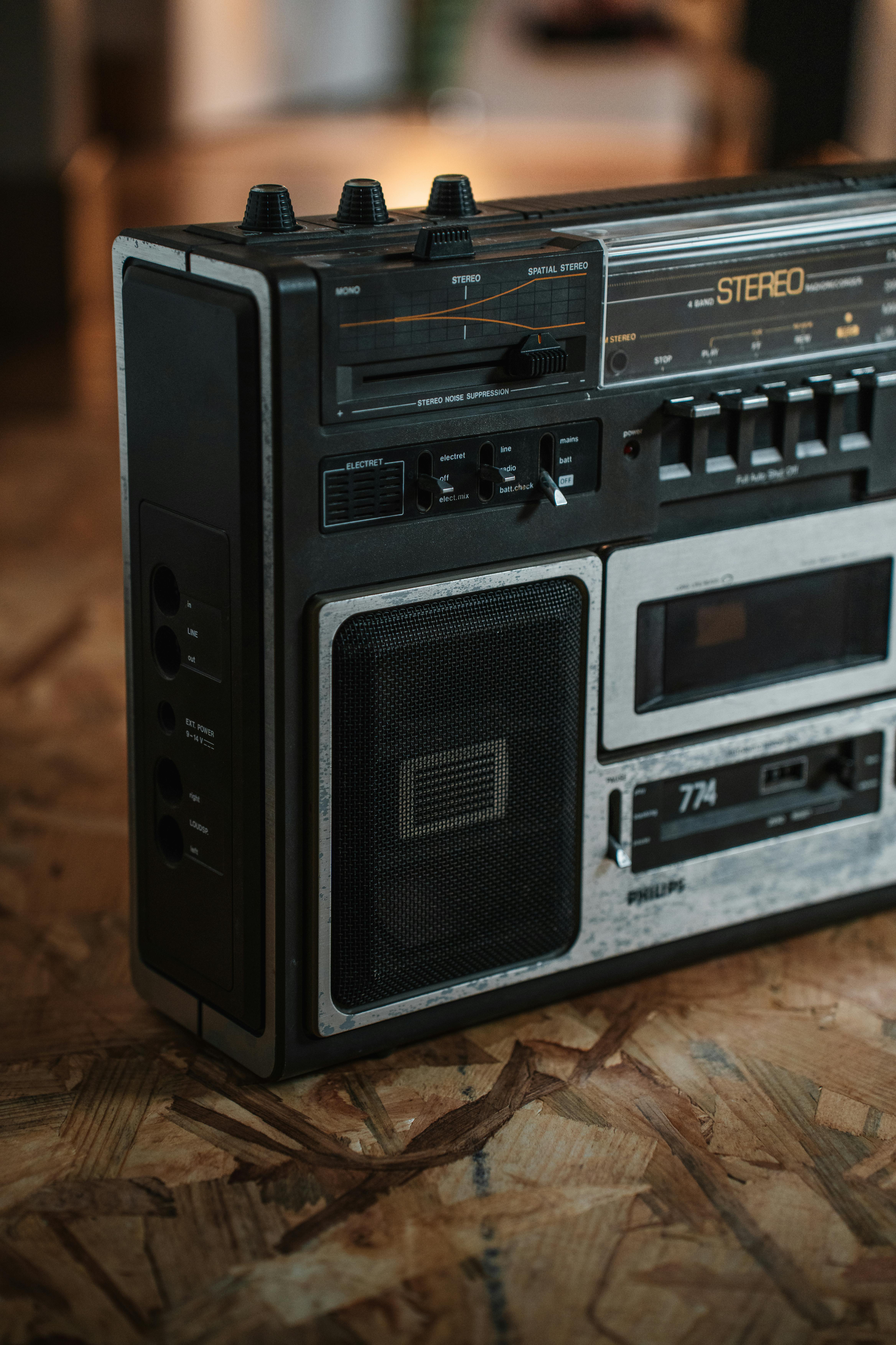 Vintage Portable Stereo Boombox on Wooden Surface · Free Stock Photo