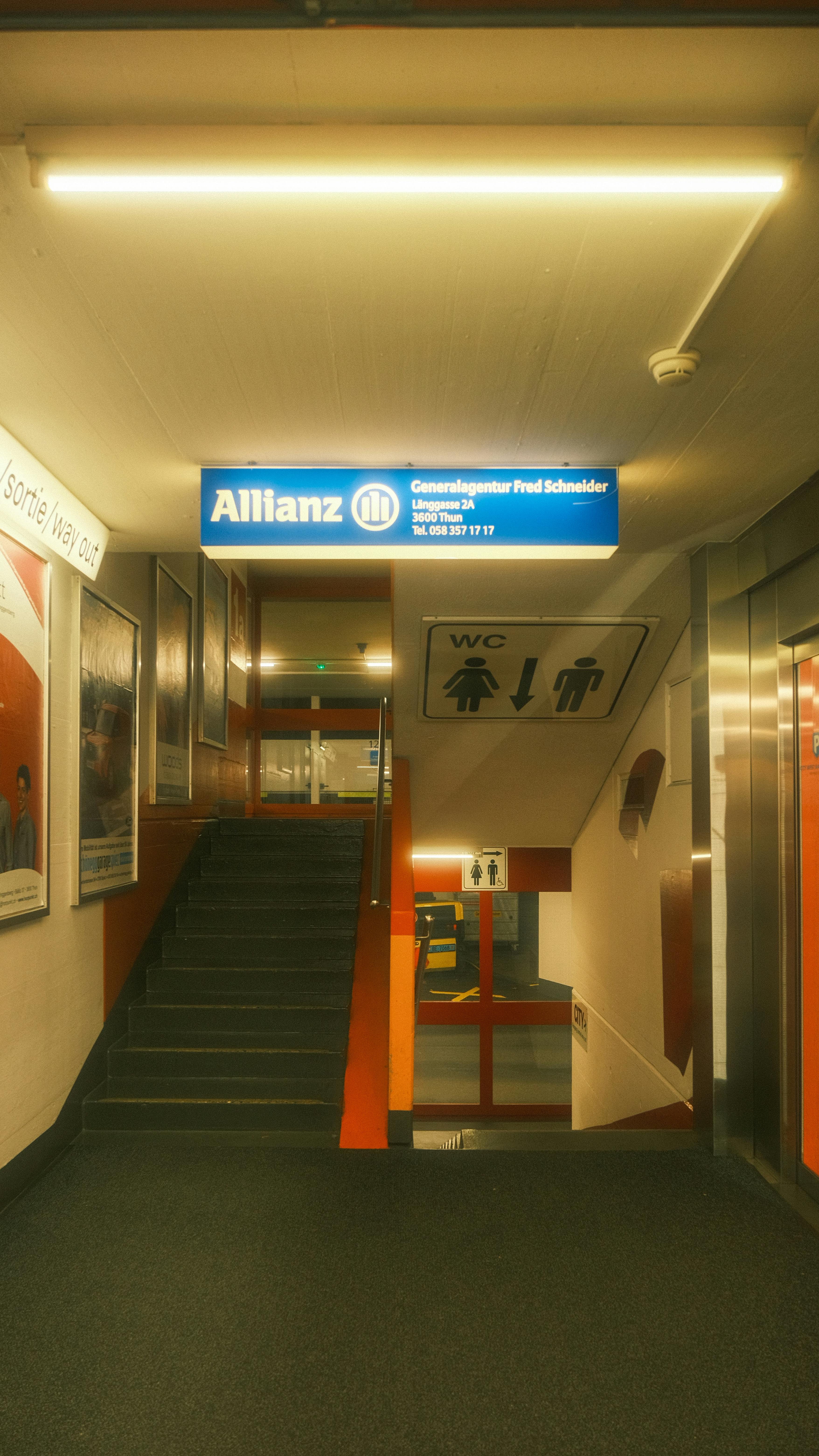 Indoor Staircase with Allianz Office Signage · Free Stock Photo