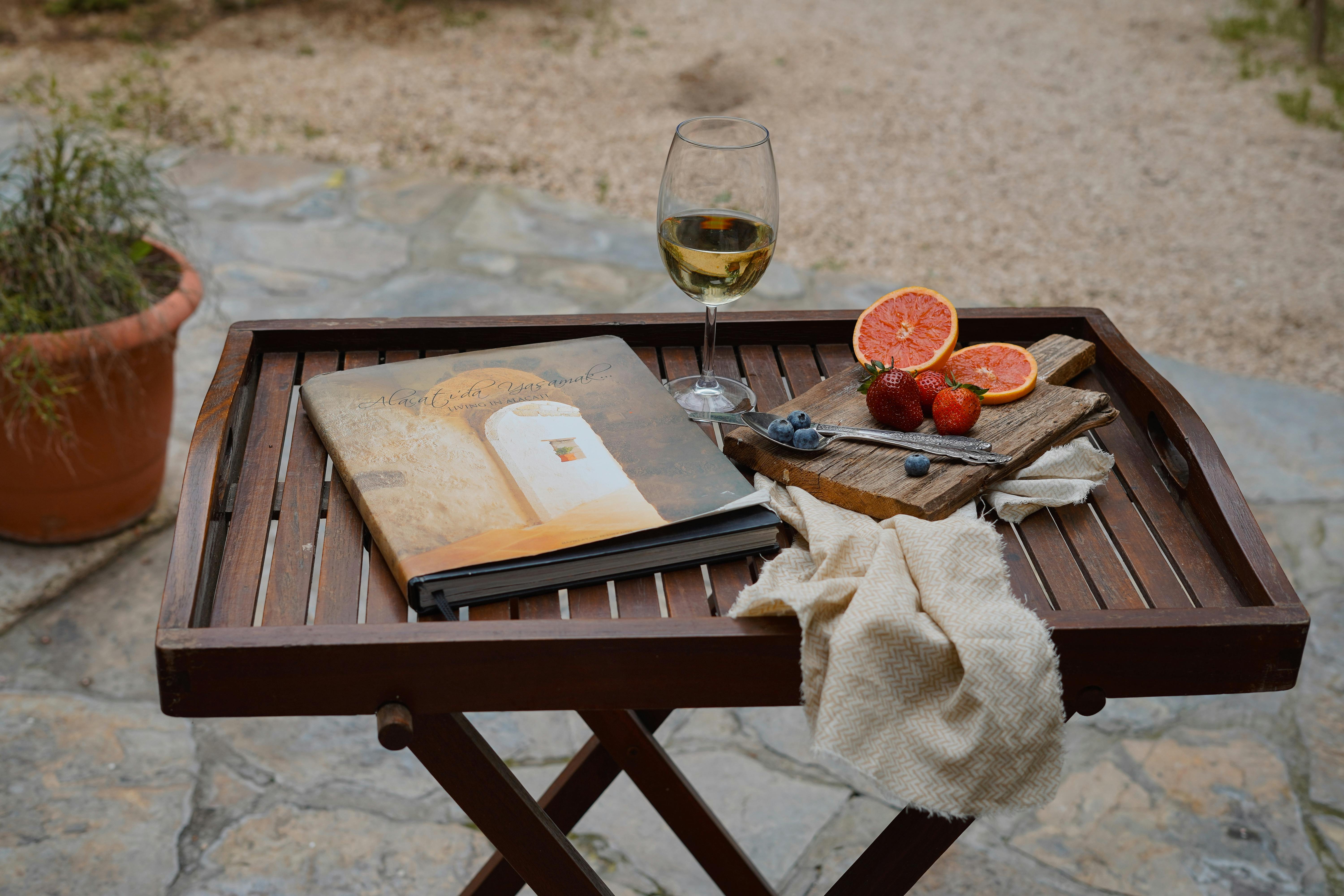 Elegant Outdoor Snack Setup with Wine and Fruit · Free Stock Photo