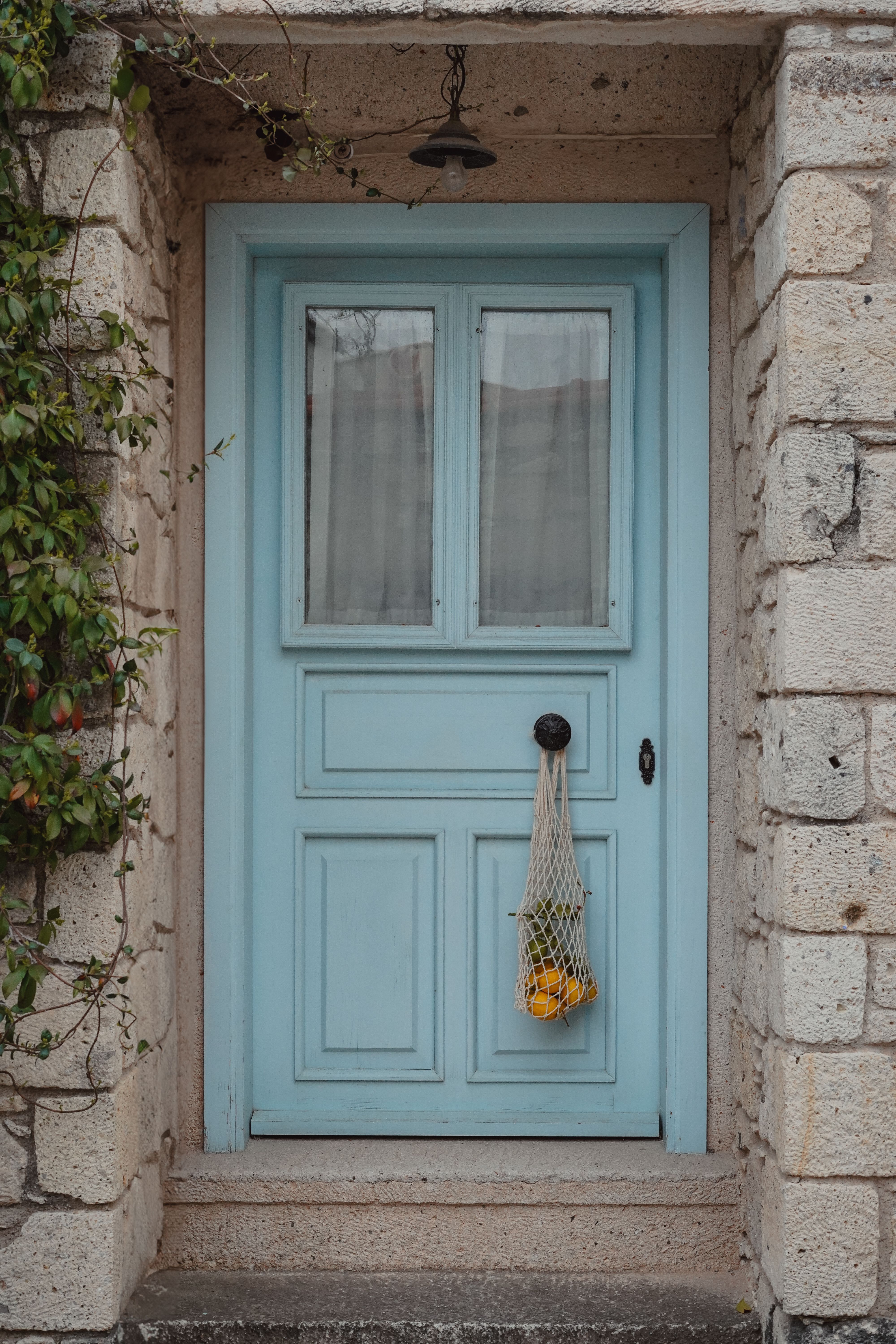 Charming Blue Wooden Door with Vintage Appeal · Free Stock Photo