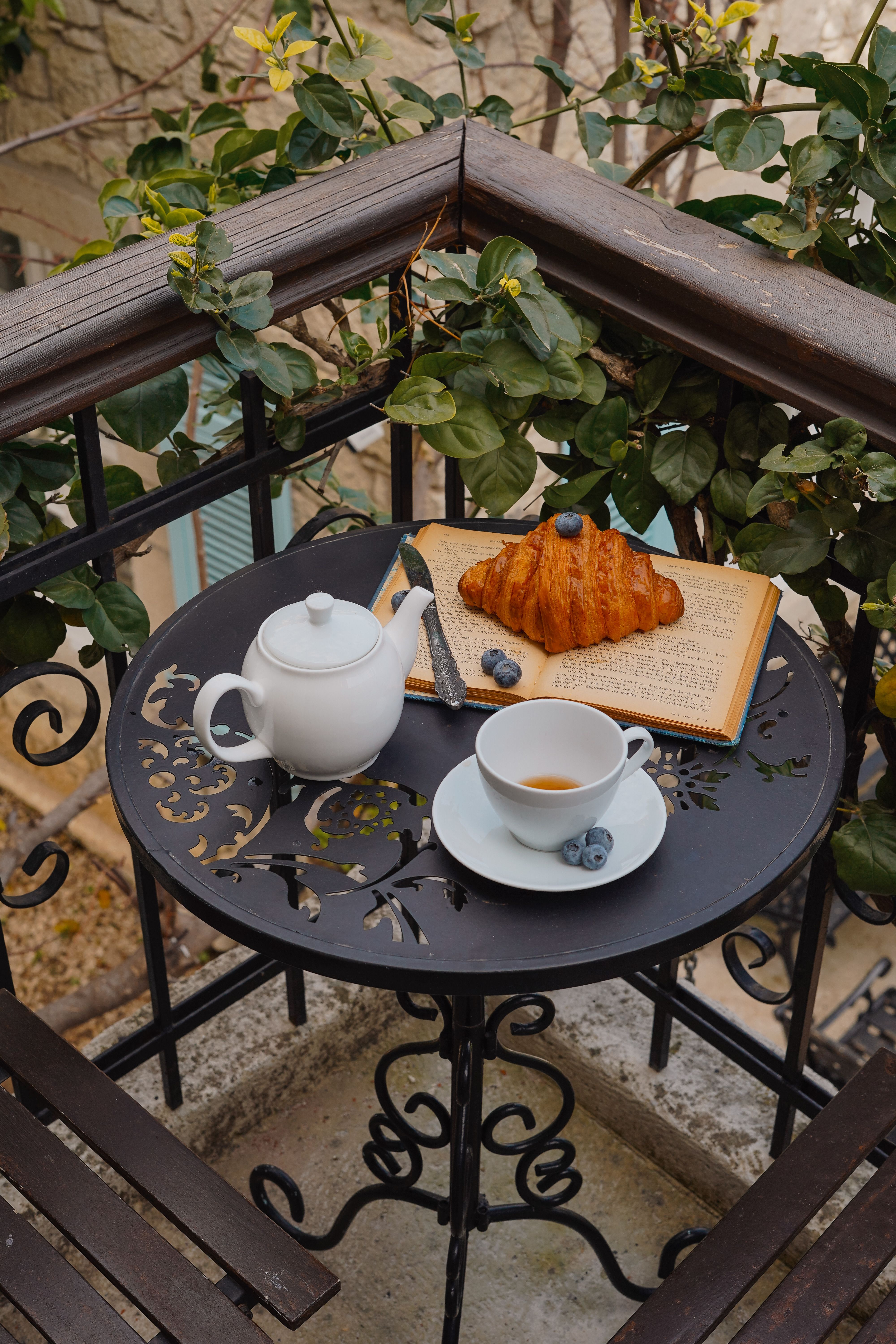 Elegant Breakfast on a Balcony with Croissant · Free Stock Photo