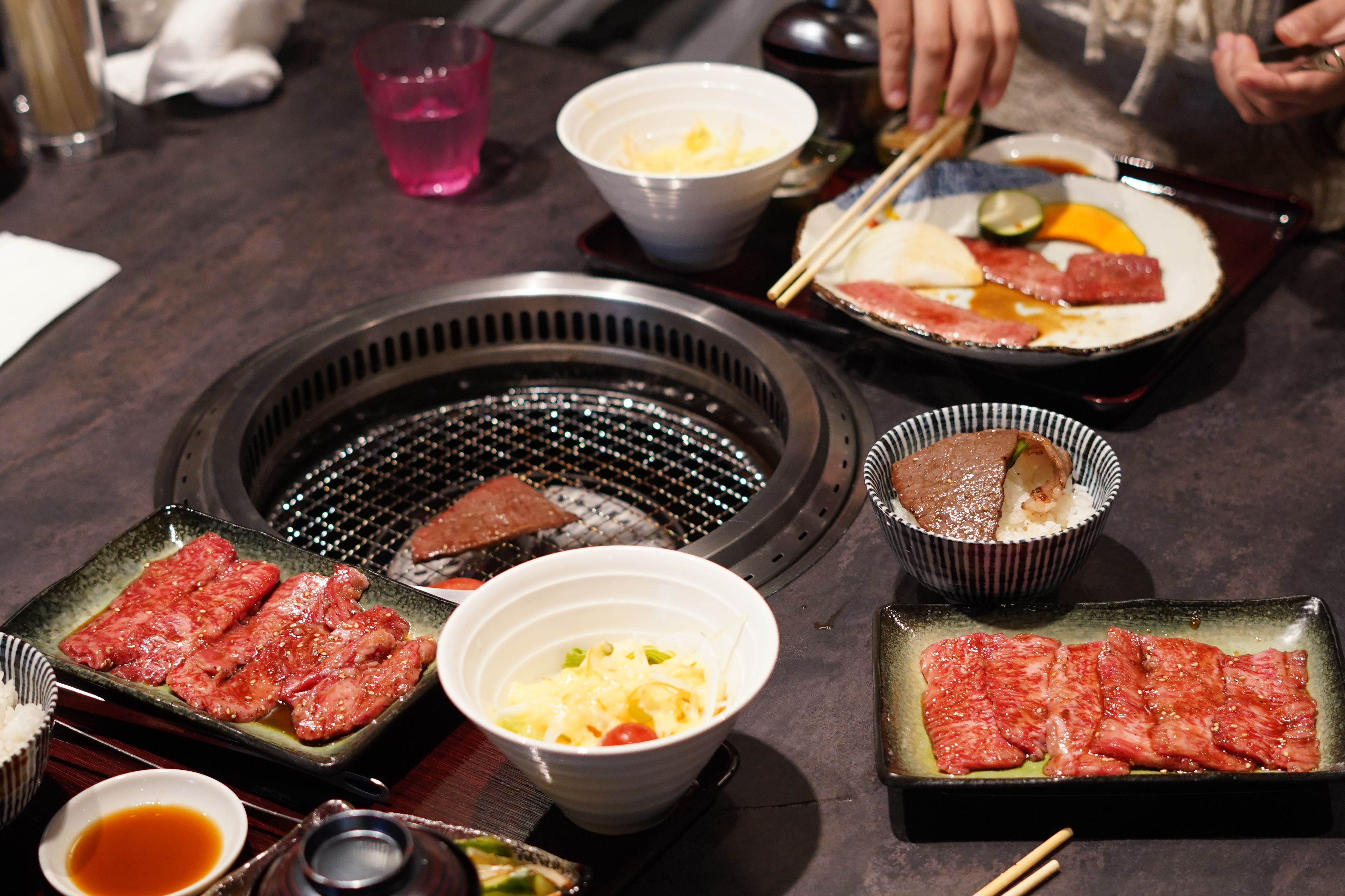 Japanese Yakiniku with Grilled Meat and Side Dishes · Free Stock Photo