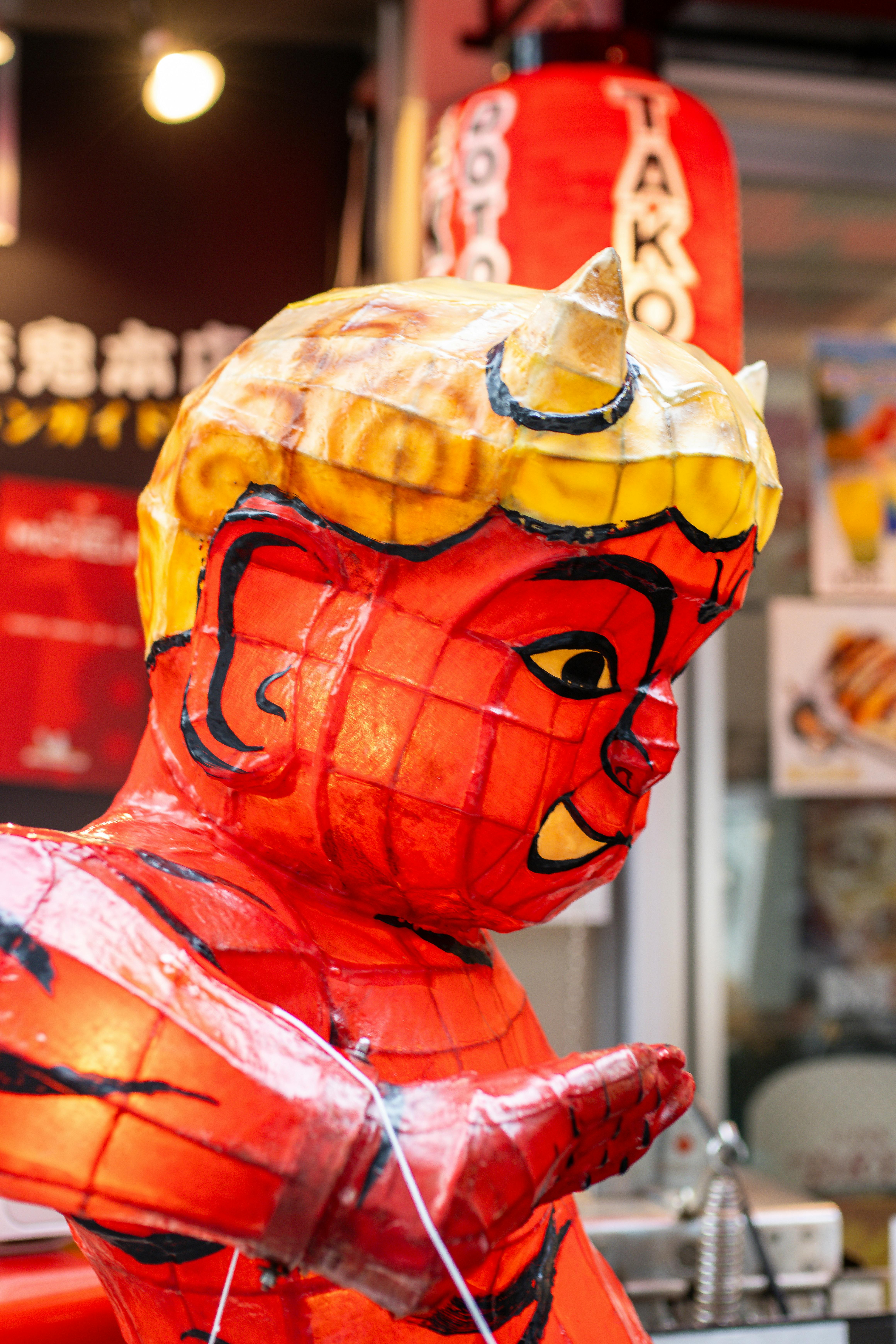Vibrant Red Oni Statue in Japanese Market · Free Stock Photo