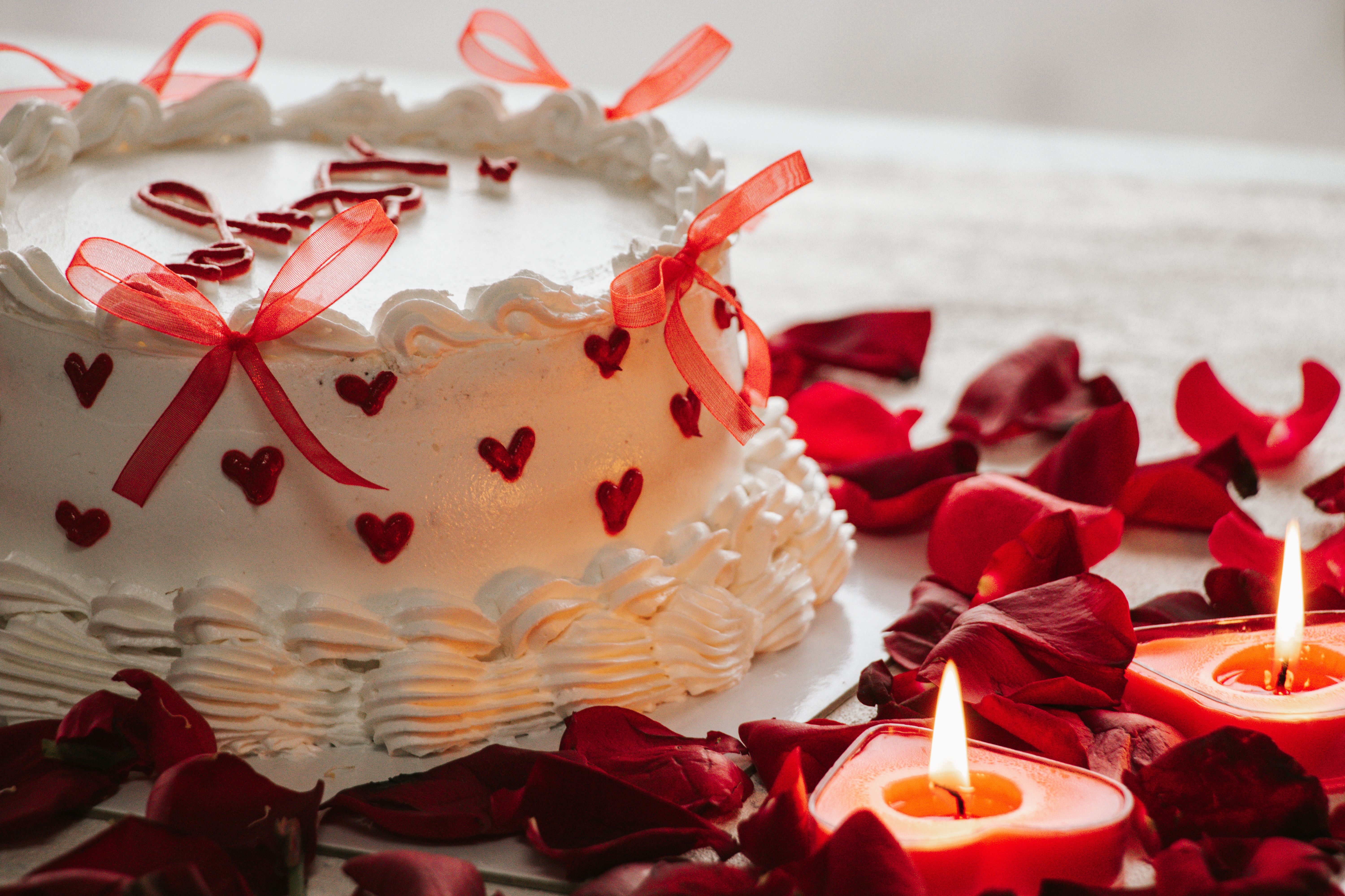 Romantic Cake with Candles and Rose Petals · Free Stock Photo