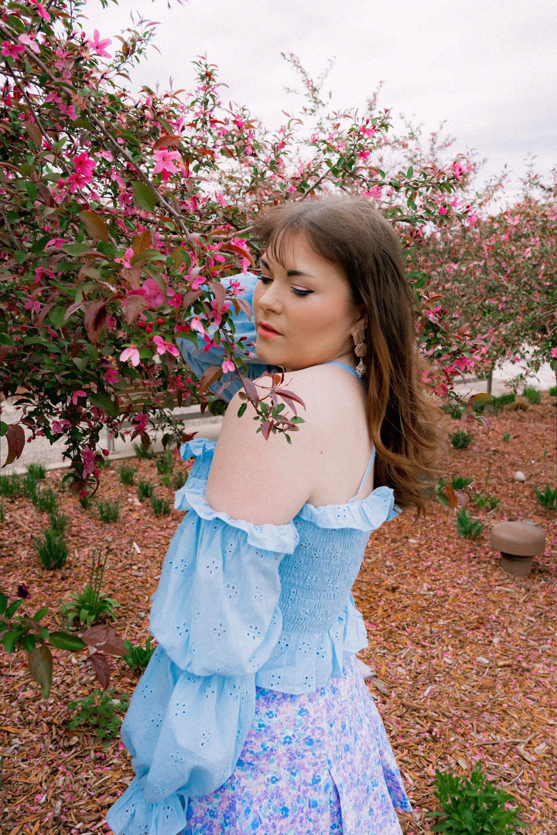 Spring Fashion Portrait Among Blooming Trees · Free Stock Photo