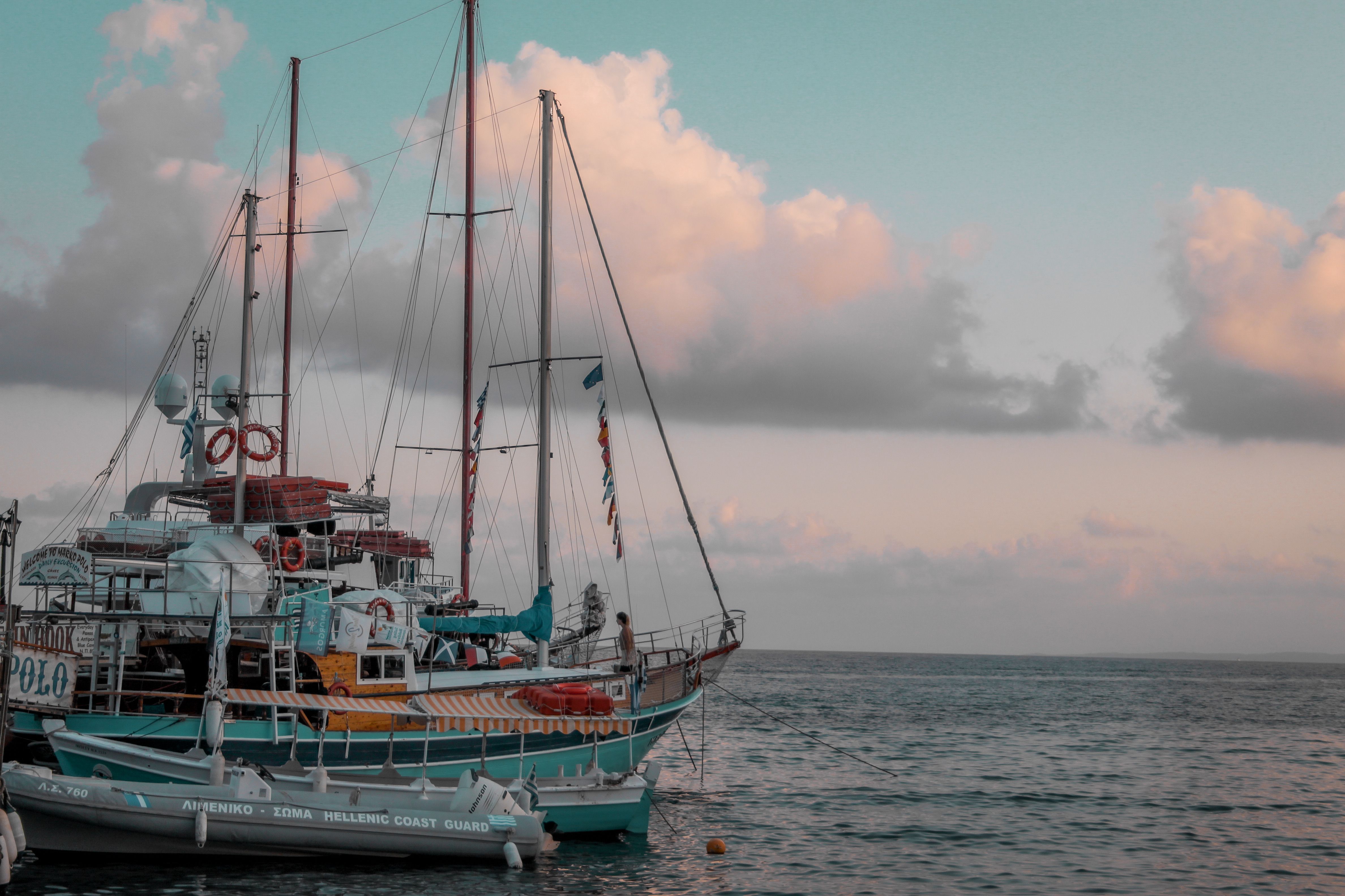 Colorful Sailing Ship Docked by the Coast · Free Stock Photo