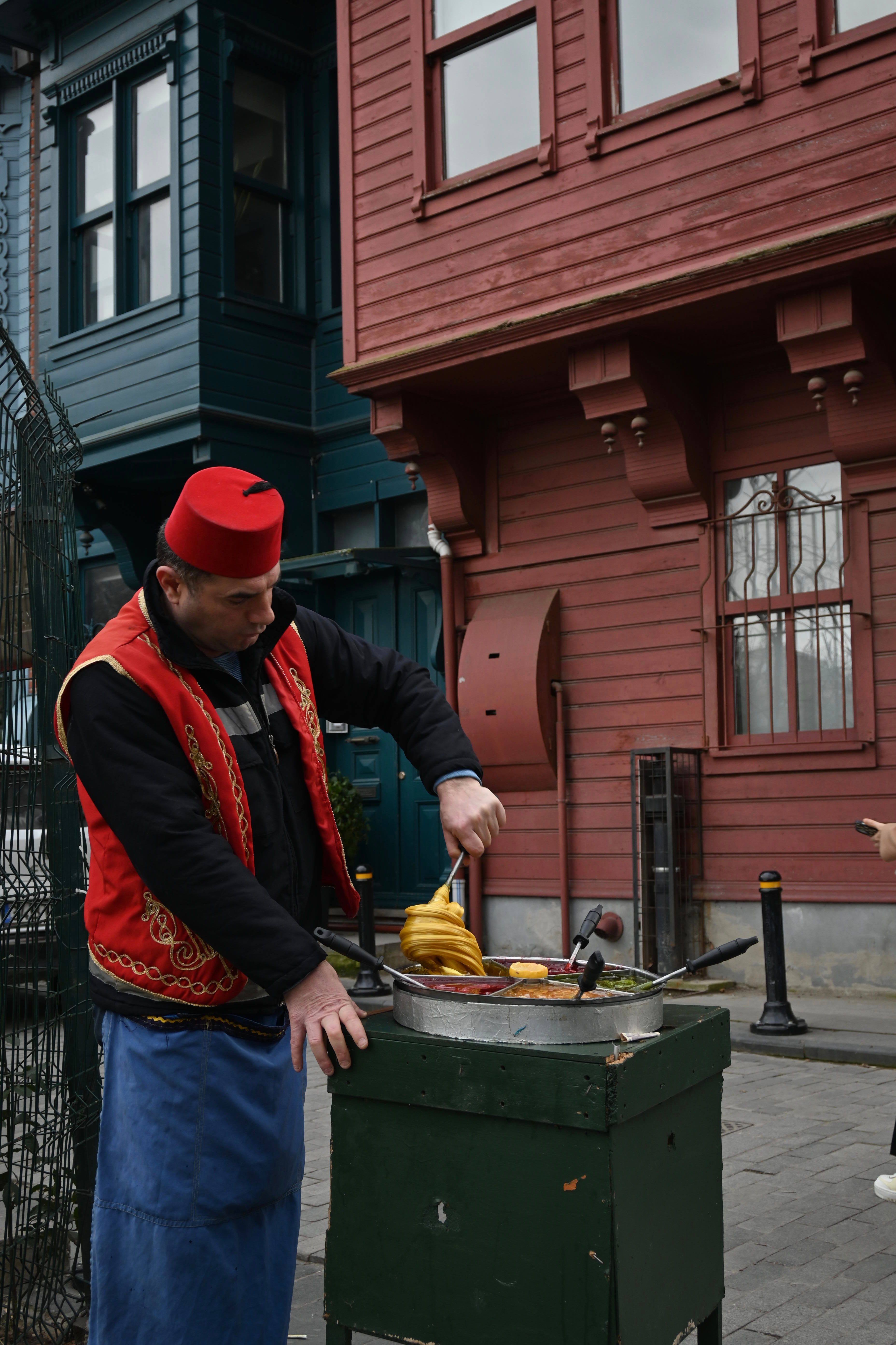 Traditional Turkish Street Vendor Making Corn · Free Stock Photo