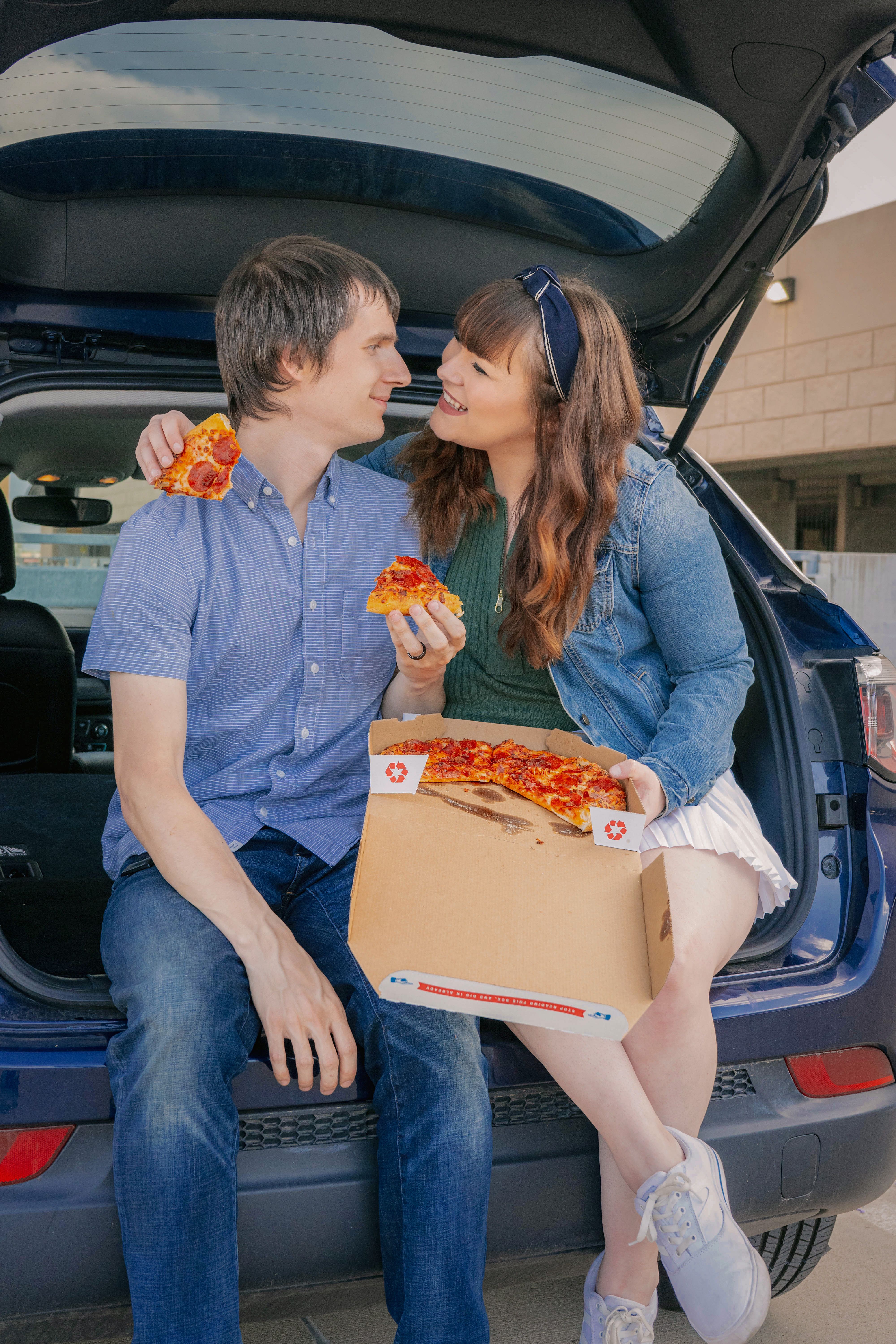 Romantic Pizza Picnic at the Back of a Car · Free Stock Photo