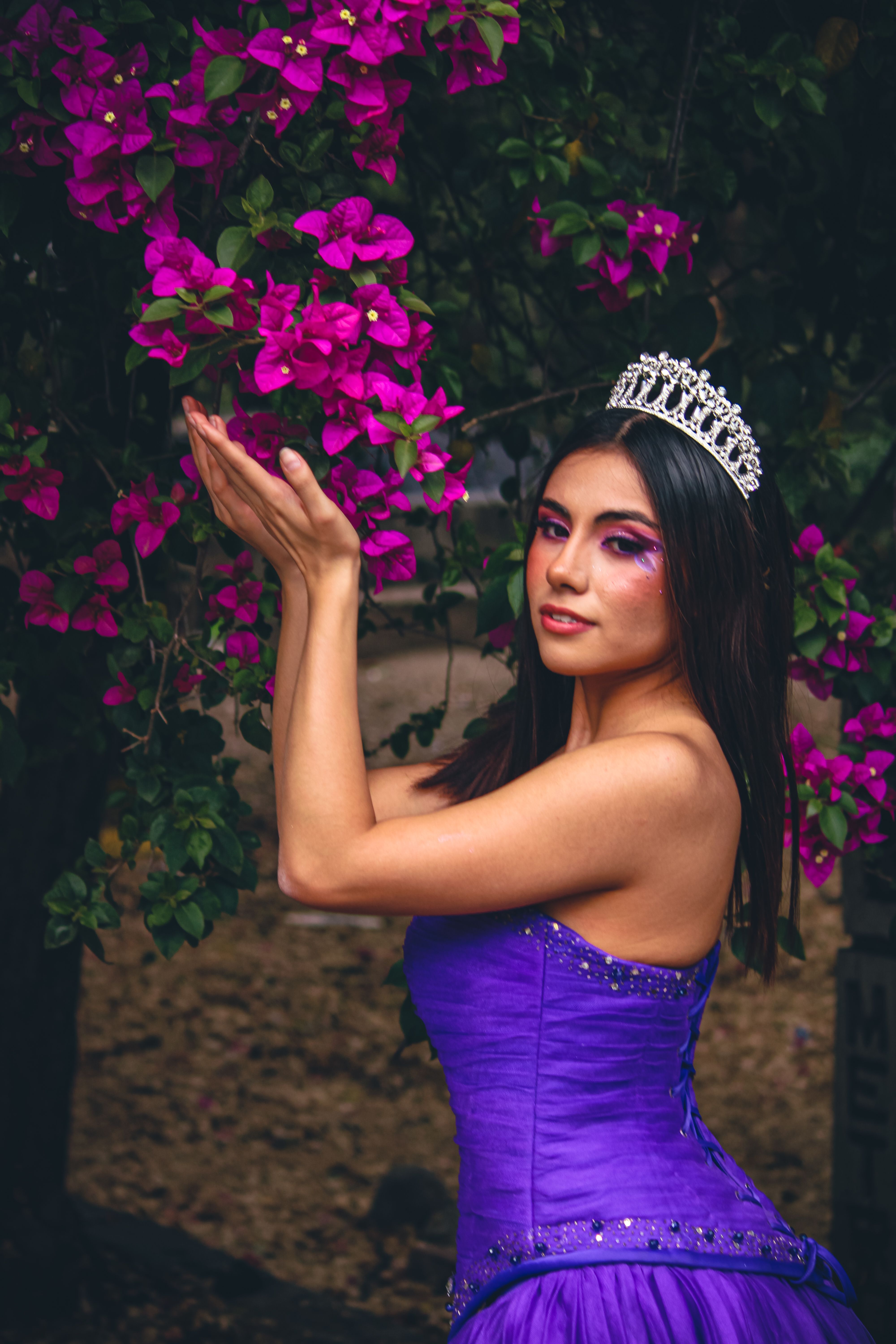 Stunning Woman in Purple Cosplay with Flowers · Free Stock Photo