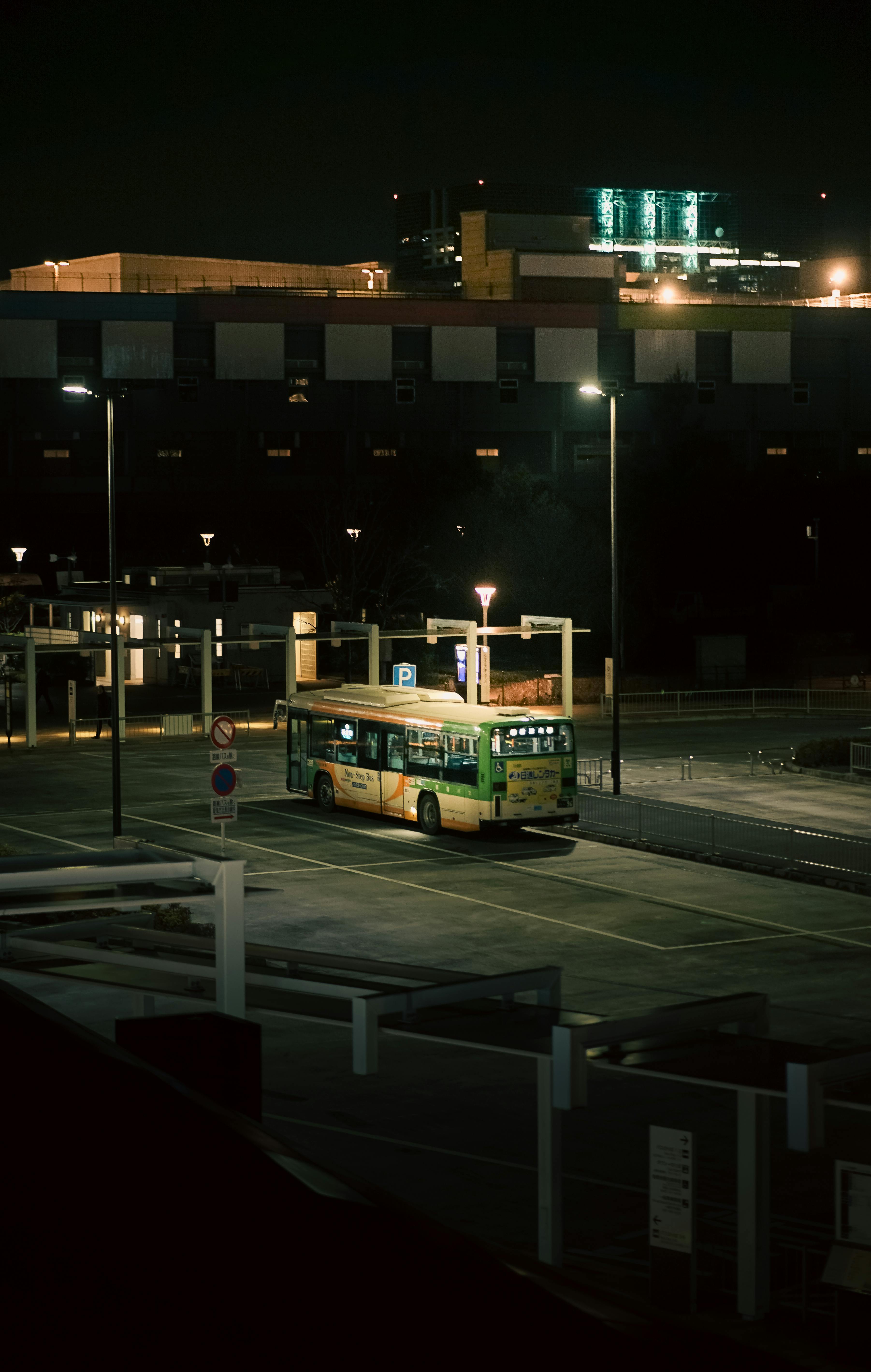 Nighttime Urban Scene with Bus in Japanese City · Free Stock Photo