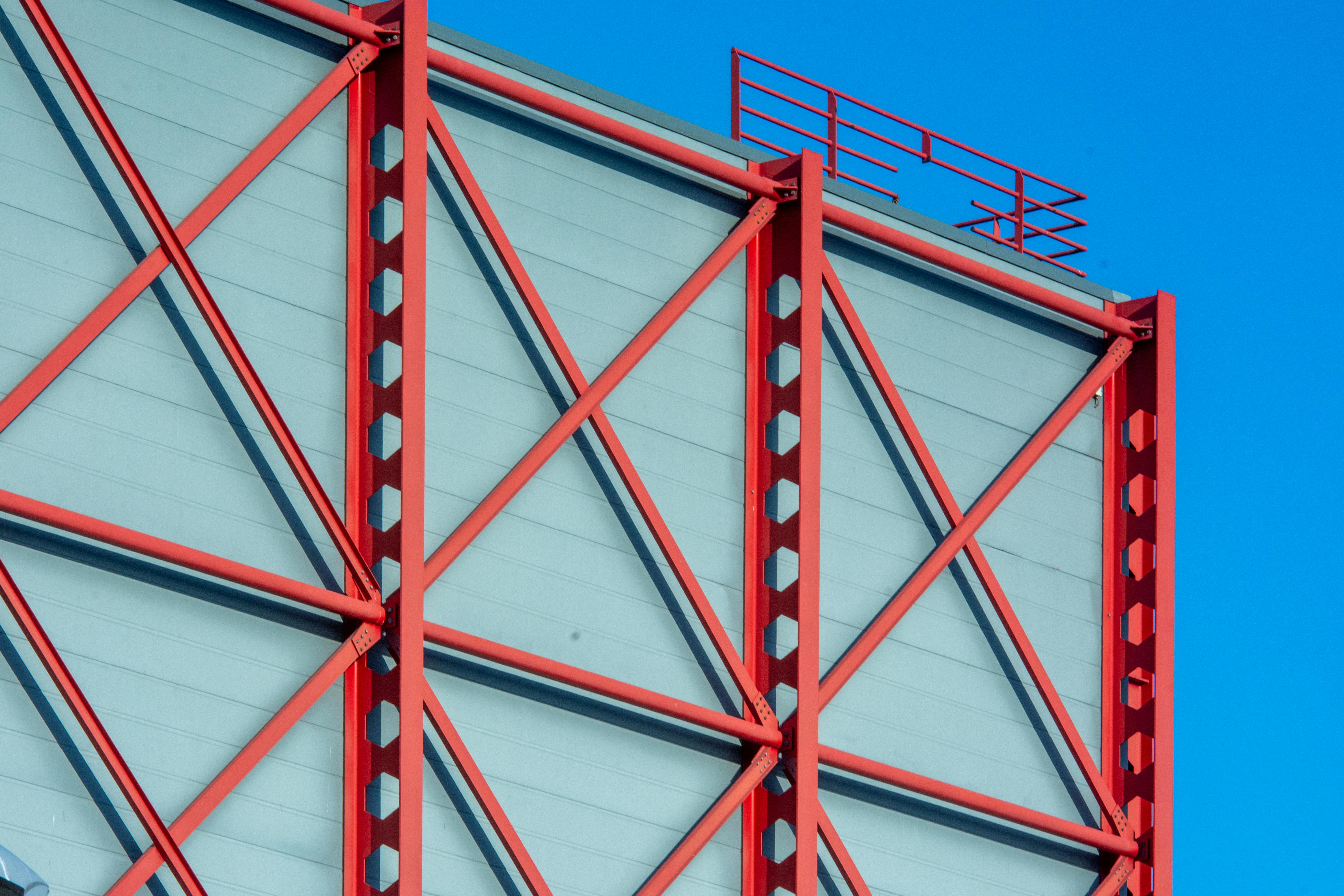 Modern Industrial Facade with Red Steel Beams · Free Stock Photo