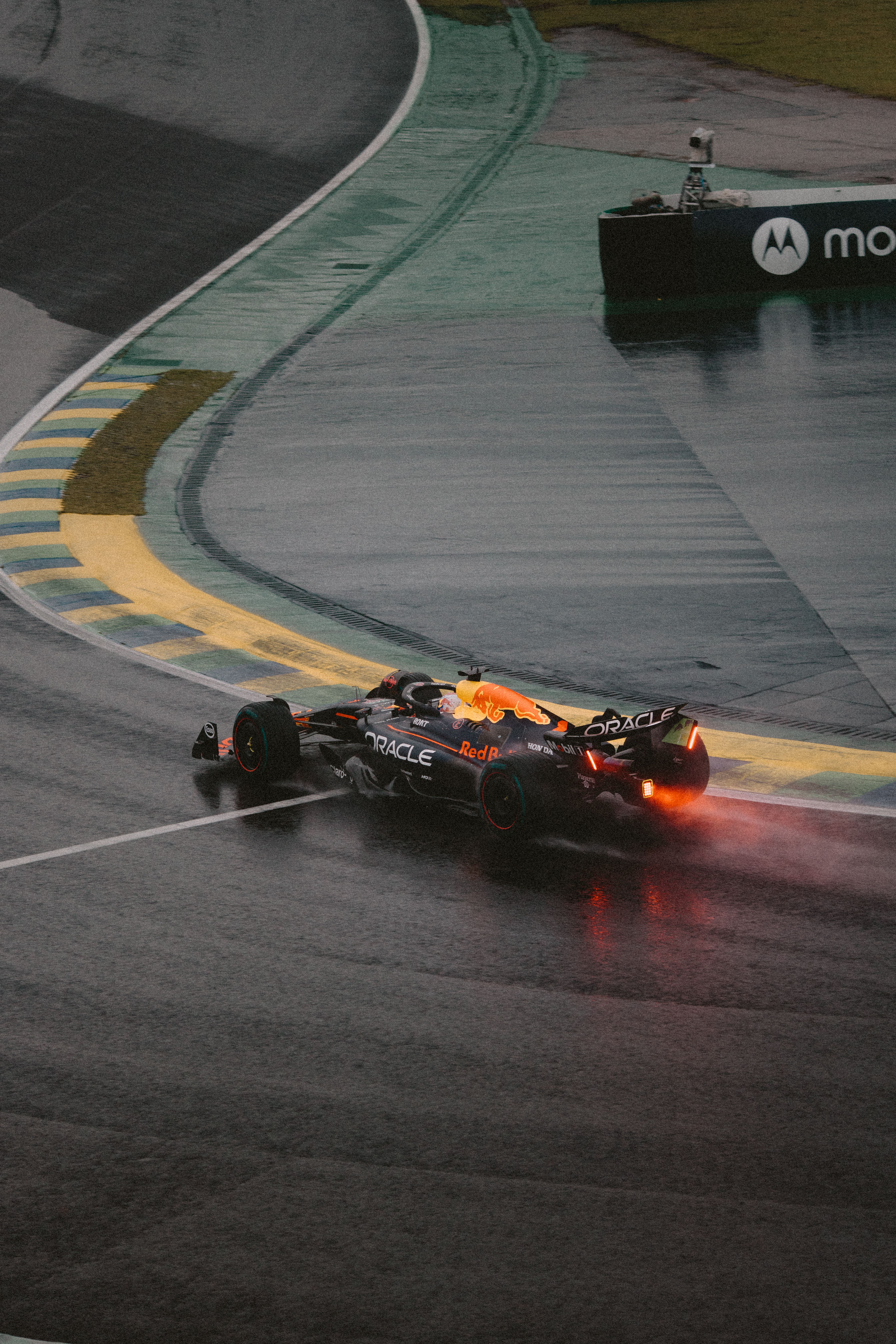 Dynamic Racing Car on Wet Track in Rain · Free Stock Photo