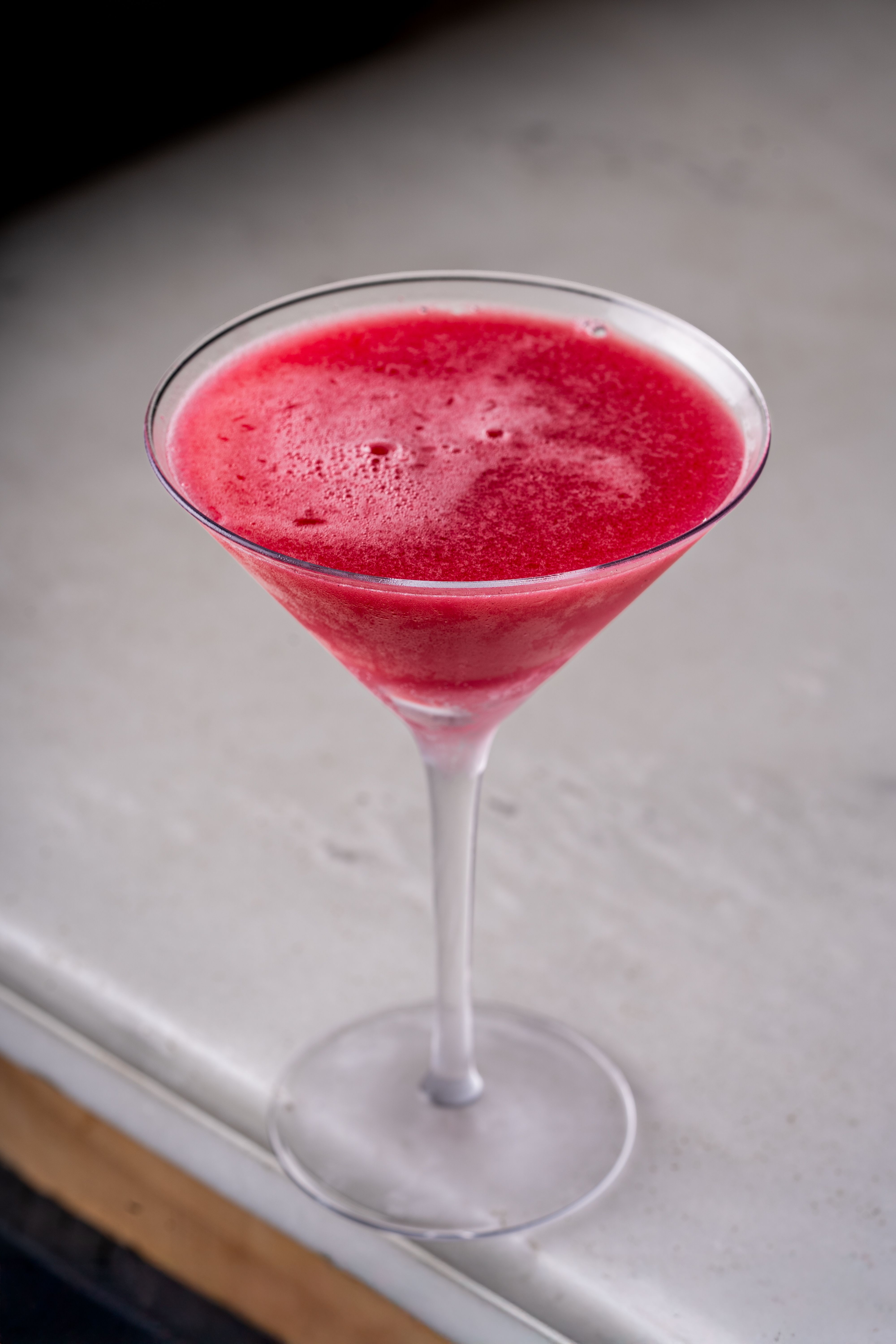 Vibrant Red Cocktail in a Classic Martini Glass · Free Stock Photo