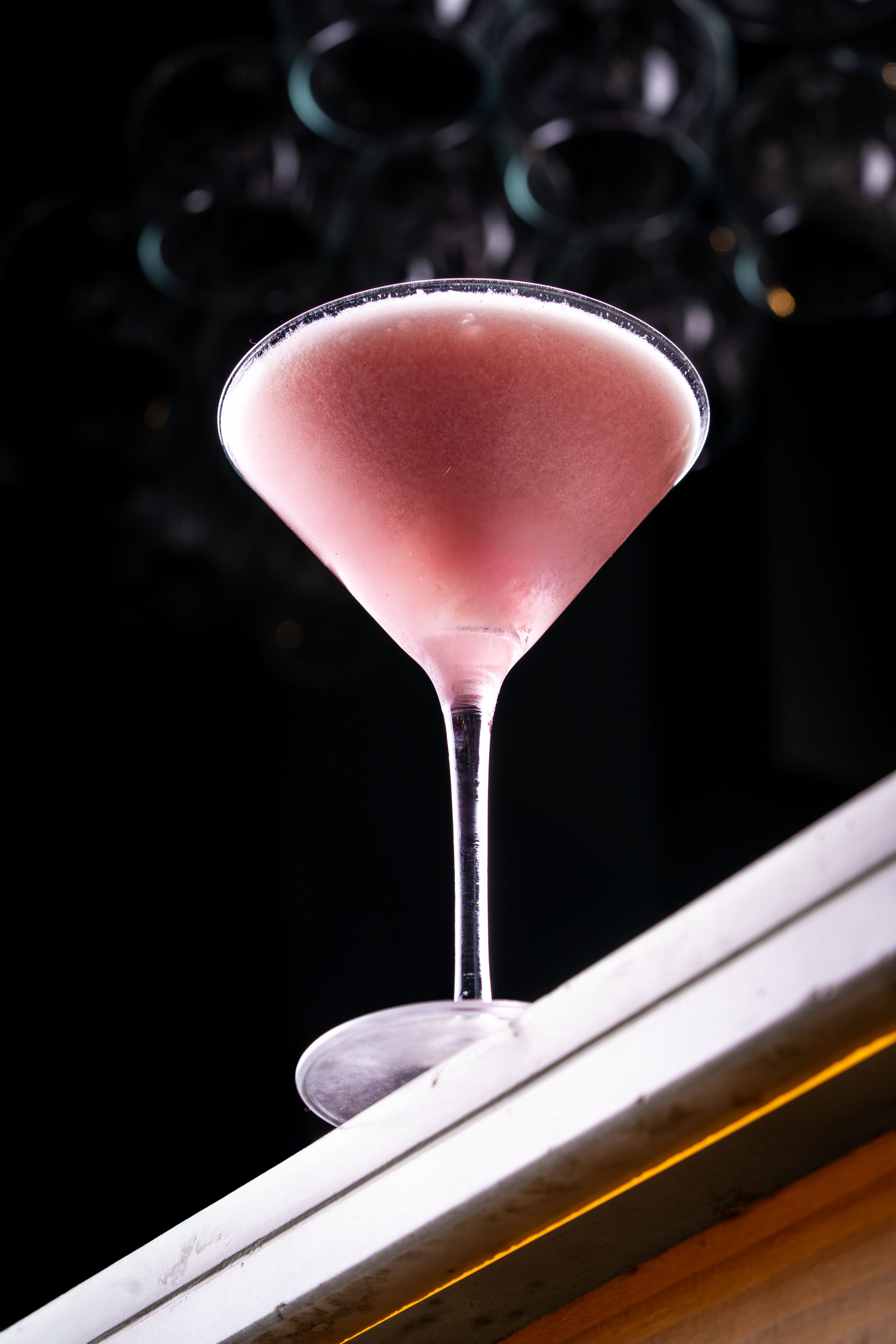 Elegant Pink Martini on Bar Counter · Free Stock Photo