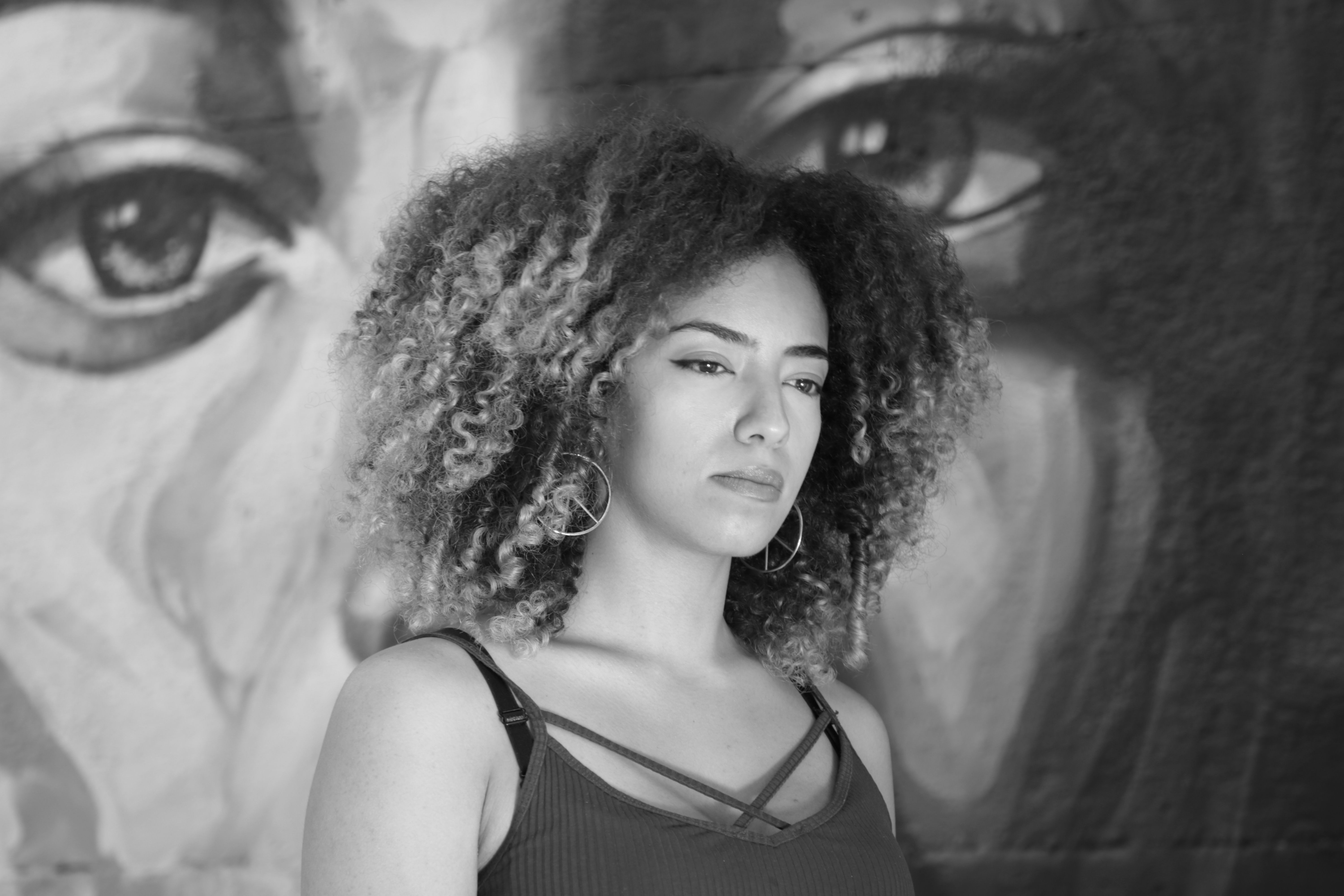 Elegant Portrait in Front of Mural Art · Free Stock Photo