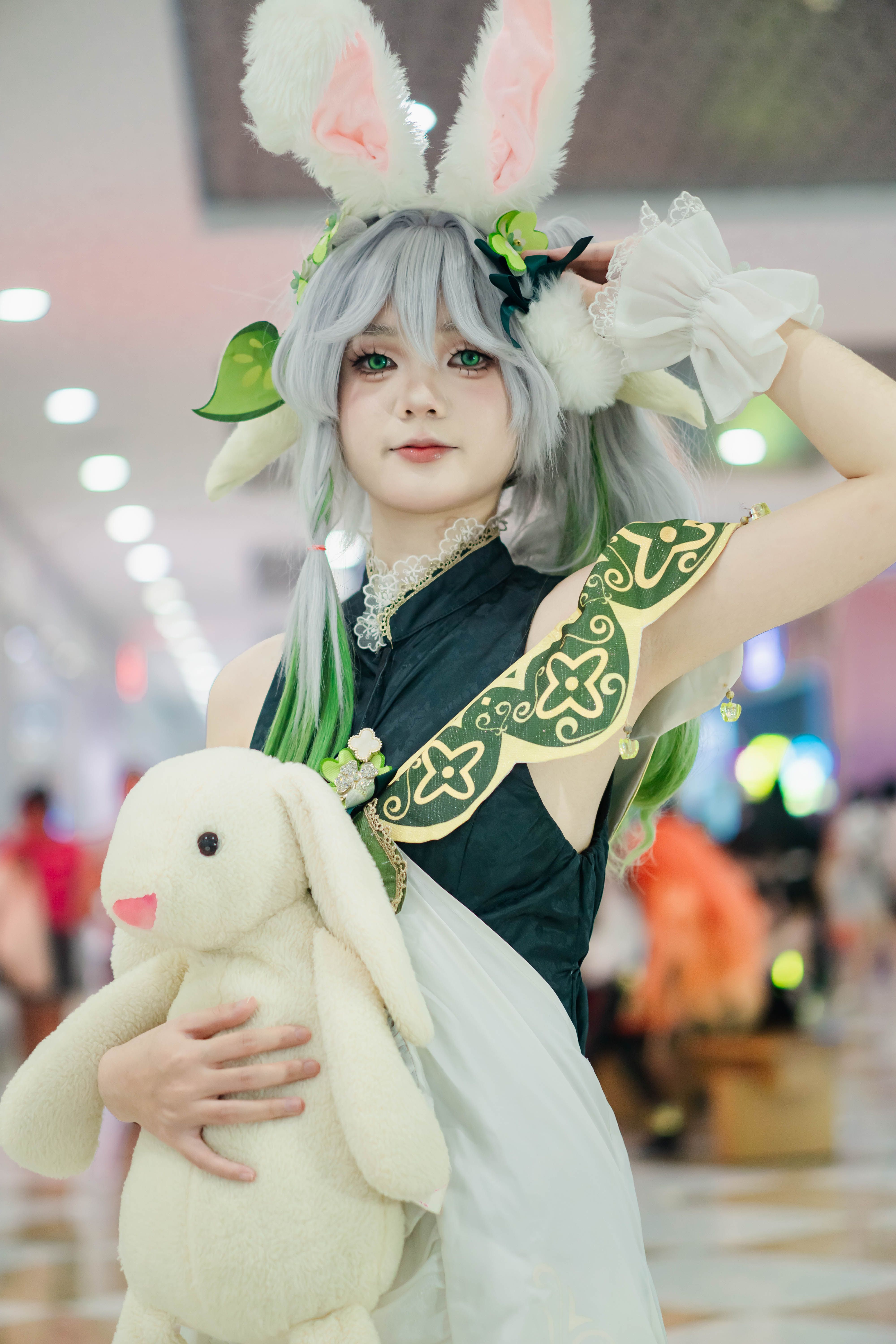 Vibrant Cosplayer in Fantasy Costume Holding Plush Rabbit · Free Stock ...