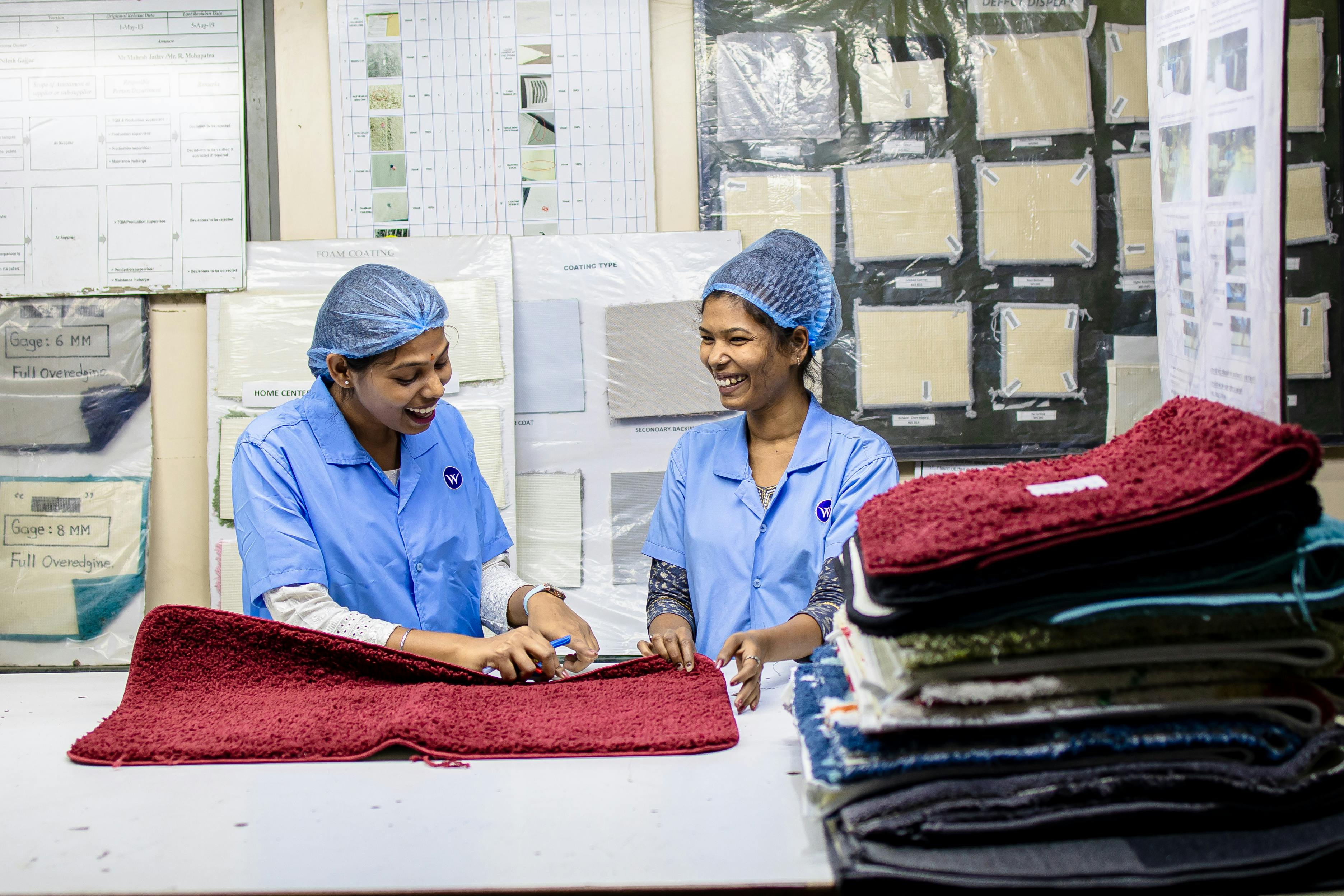 Smiling Female Textile Workers in a Factory · Free Stock Photo