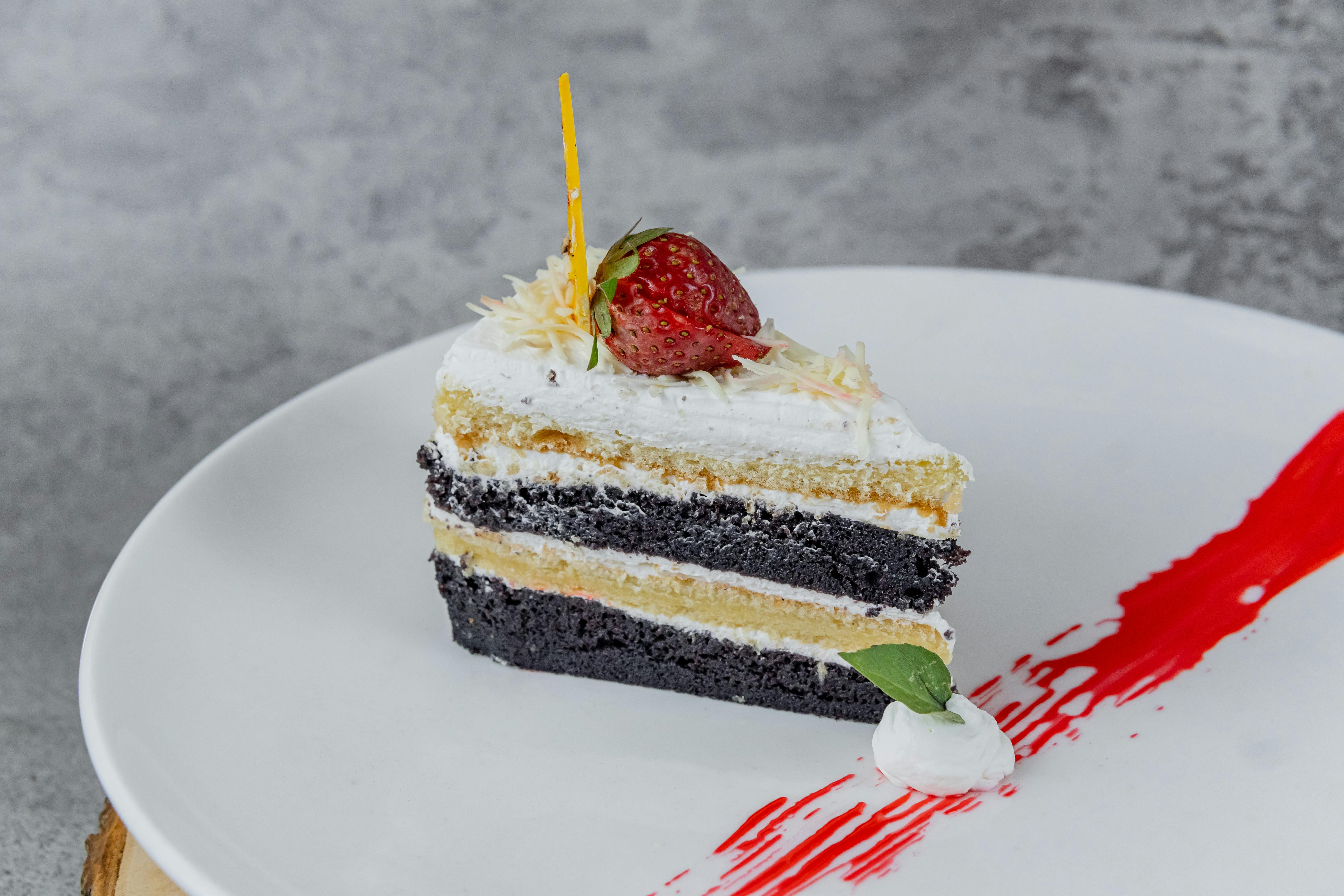 Gourmet Chocolate and Vanilla Layer Cake Slice · Free Stock Photo