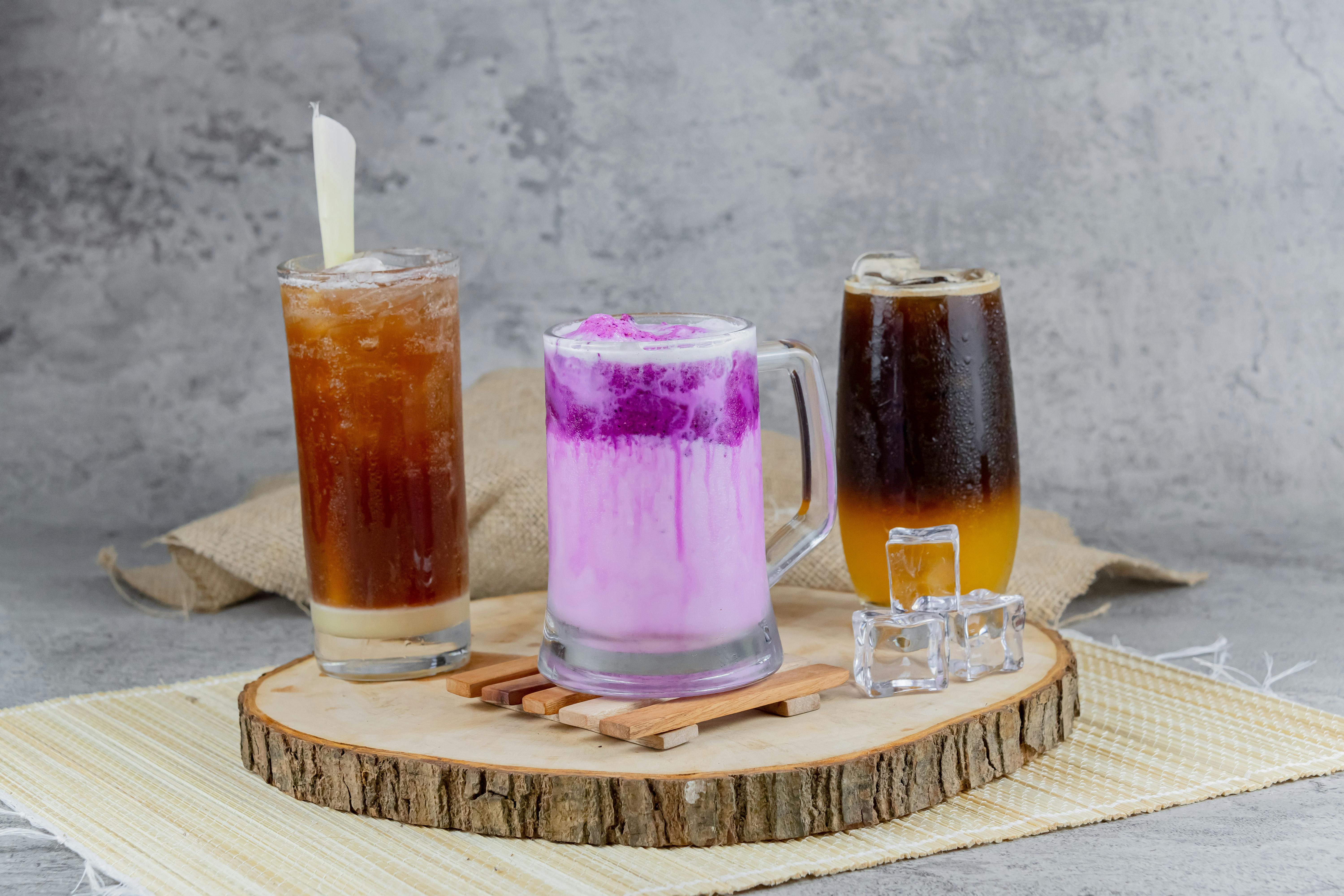 Assorted Iced Beverages on Rustic Wooden Tray · Free Stock Photo
