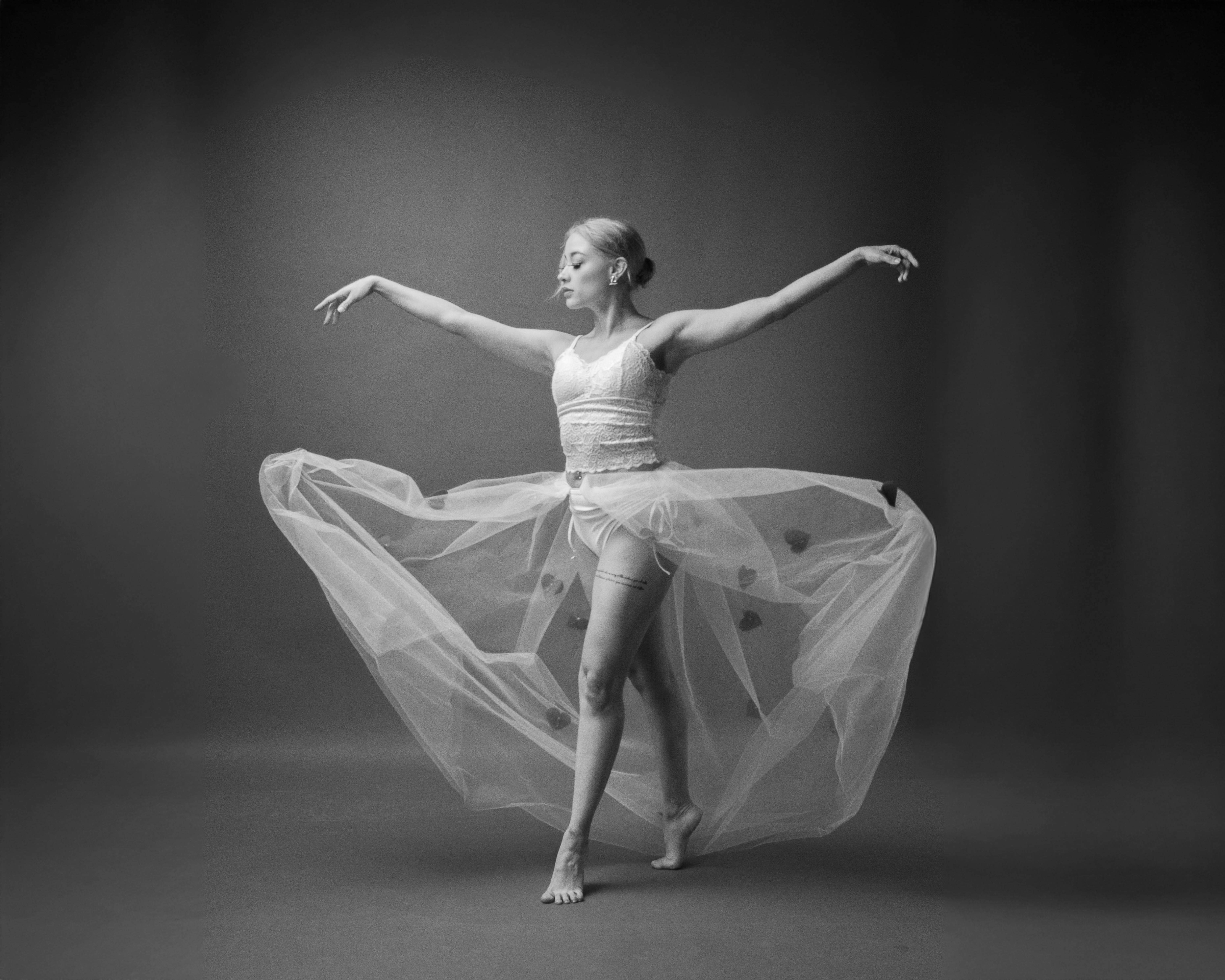 Graceful Ballerina in Motion Captured in Studio · Free Stock Photo