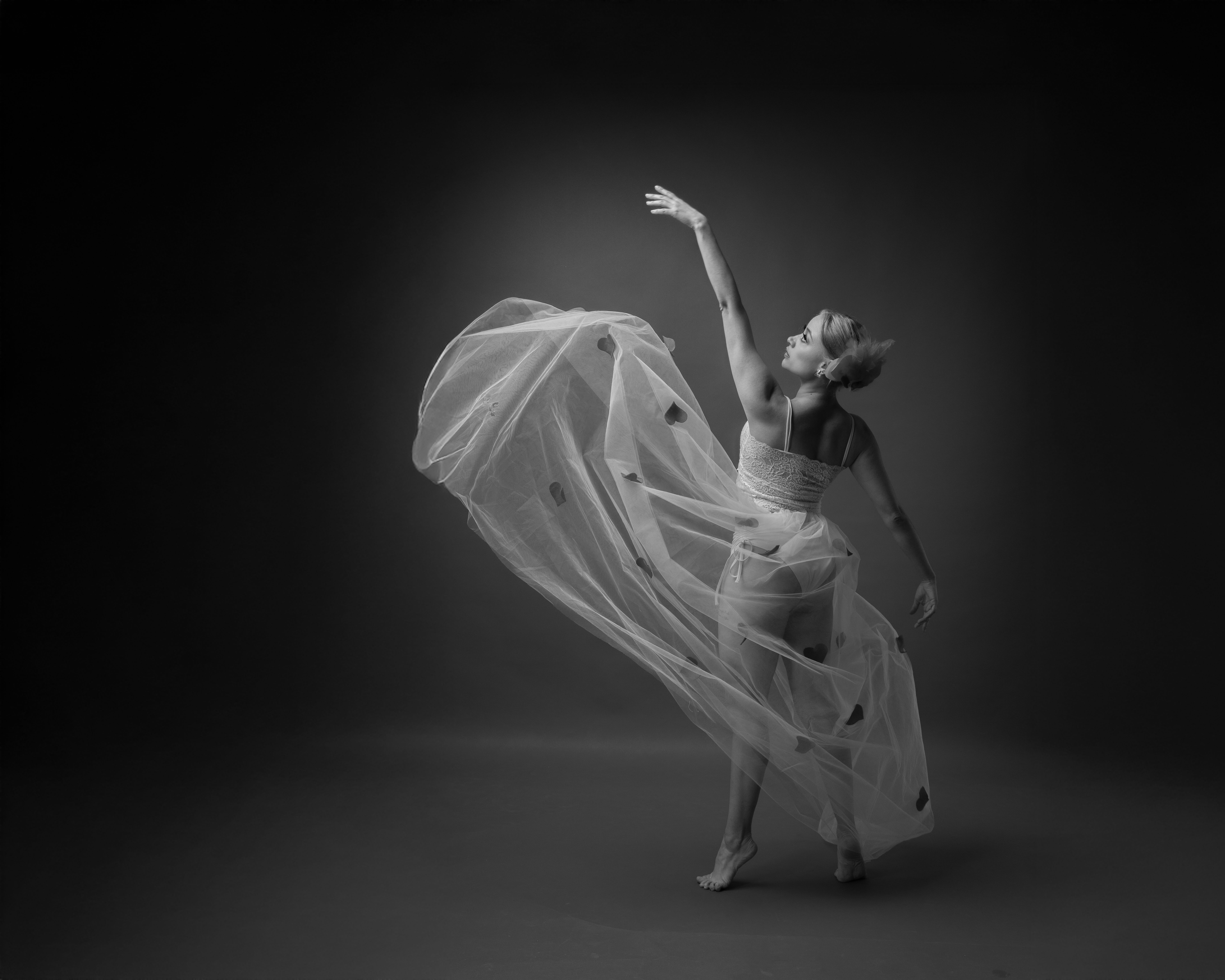Elegant Ballet Dancer in Motion with Flowing Fabric · Free Stock Photo