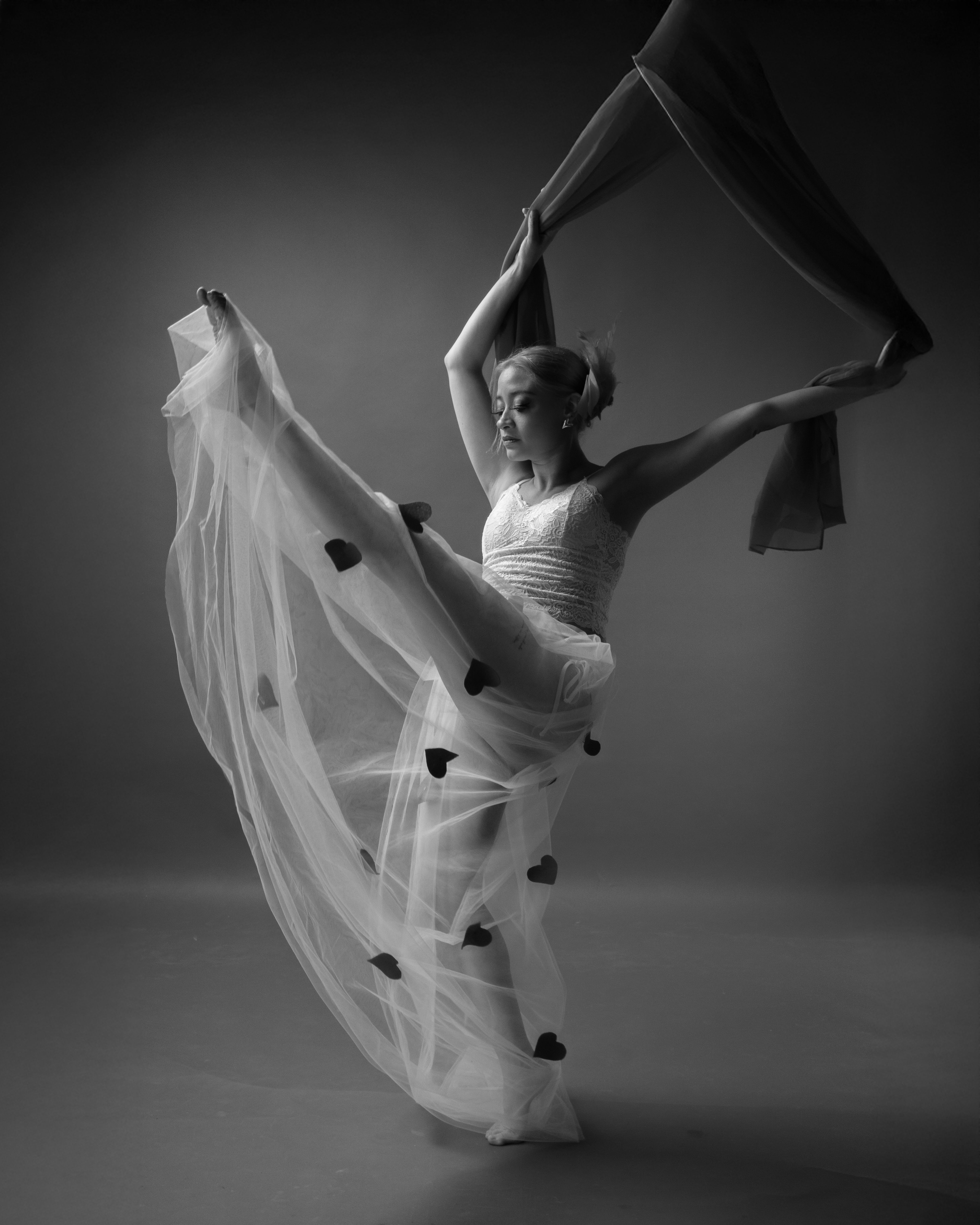 Elegant Ballet Dancer in Motion with Graceful Pose · Free Stock Photo