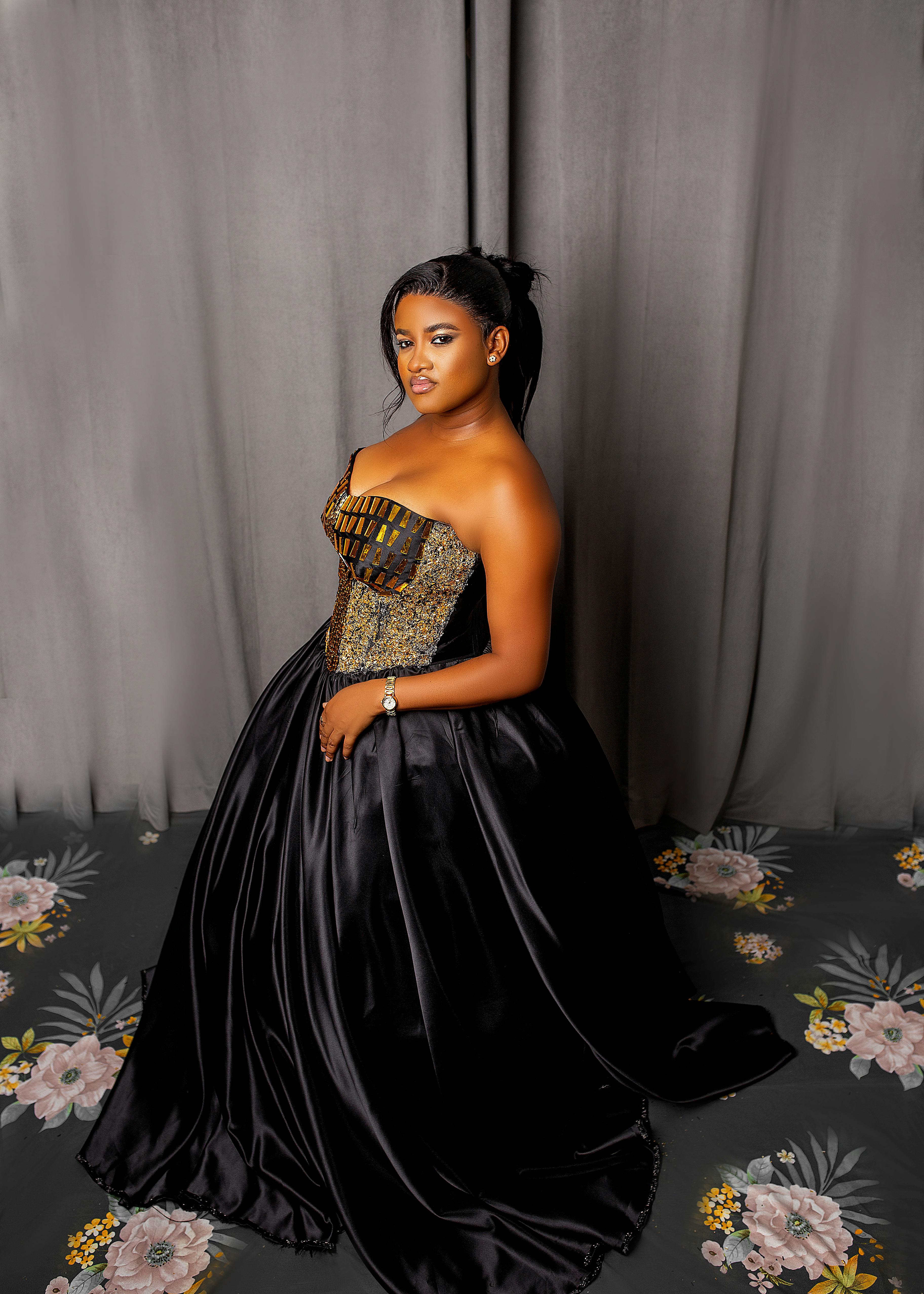 Elegant Woman in Black Evening Gown · Free Stock Photo