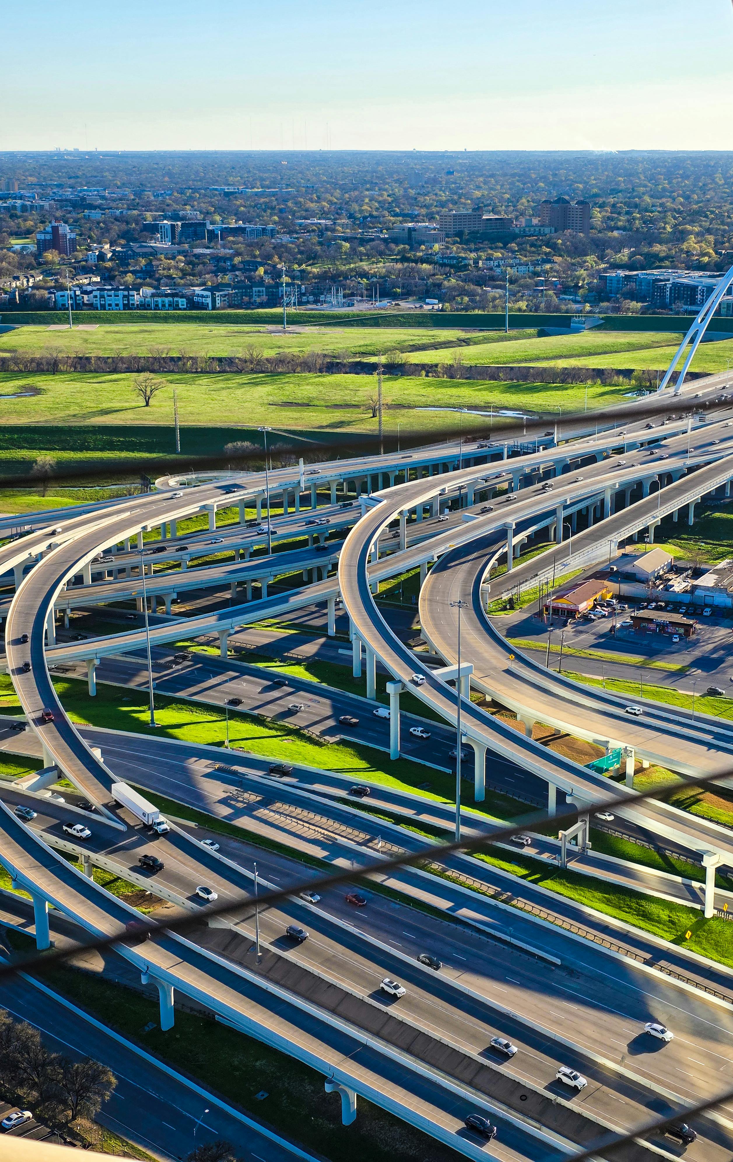 Aerial View of Urban Highway Interchange · Free Stock Photo