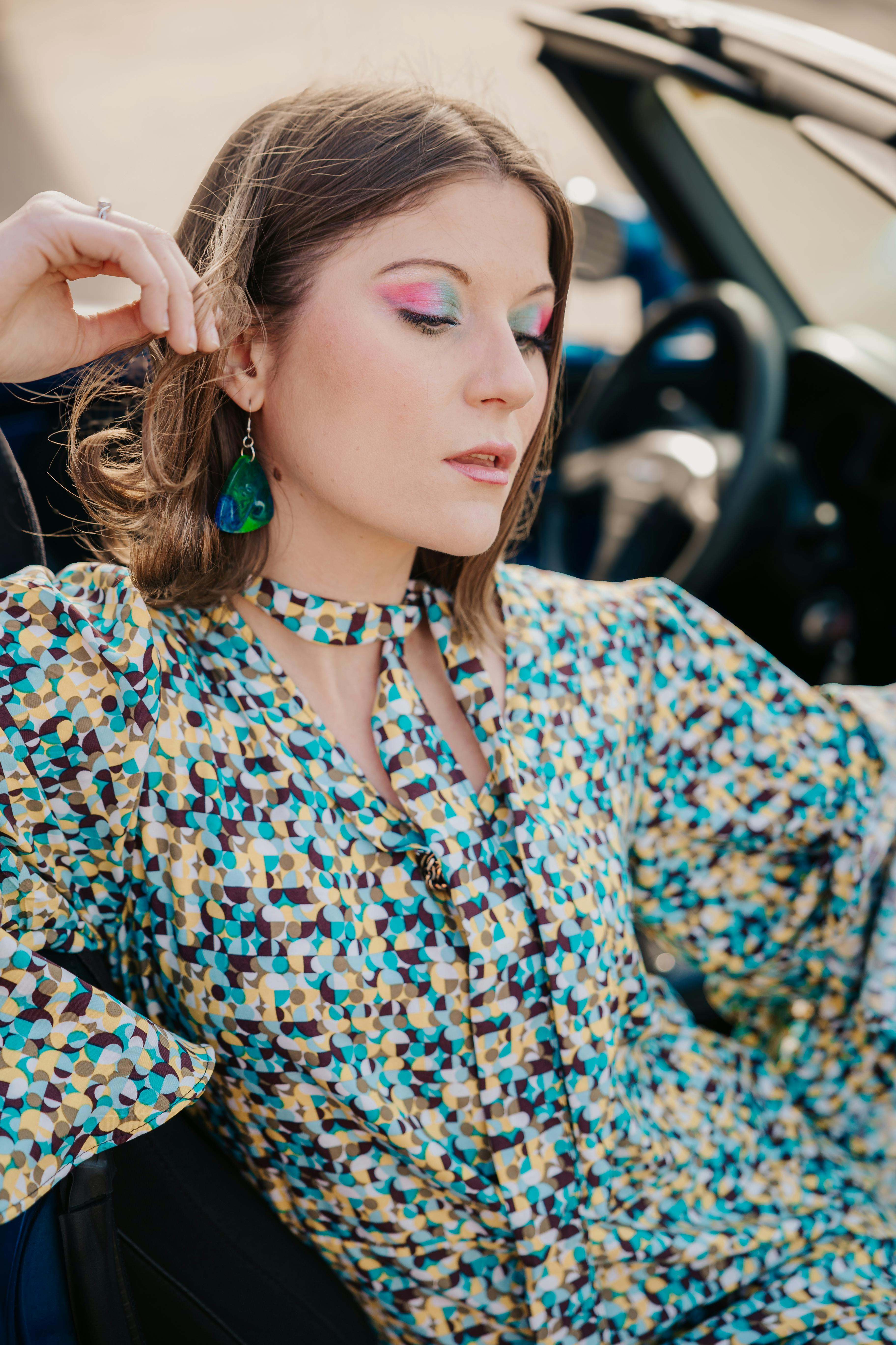 Stylish Woman Relaxing in Convertible Car · Free Stock Photo