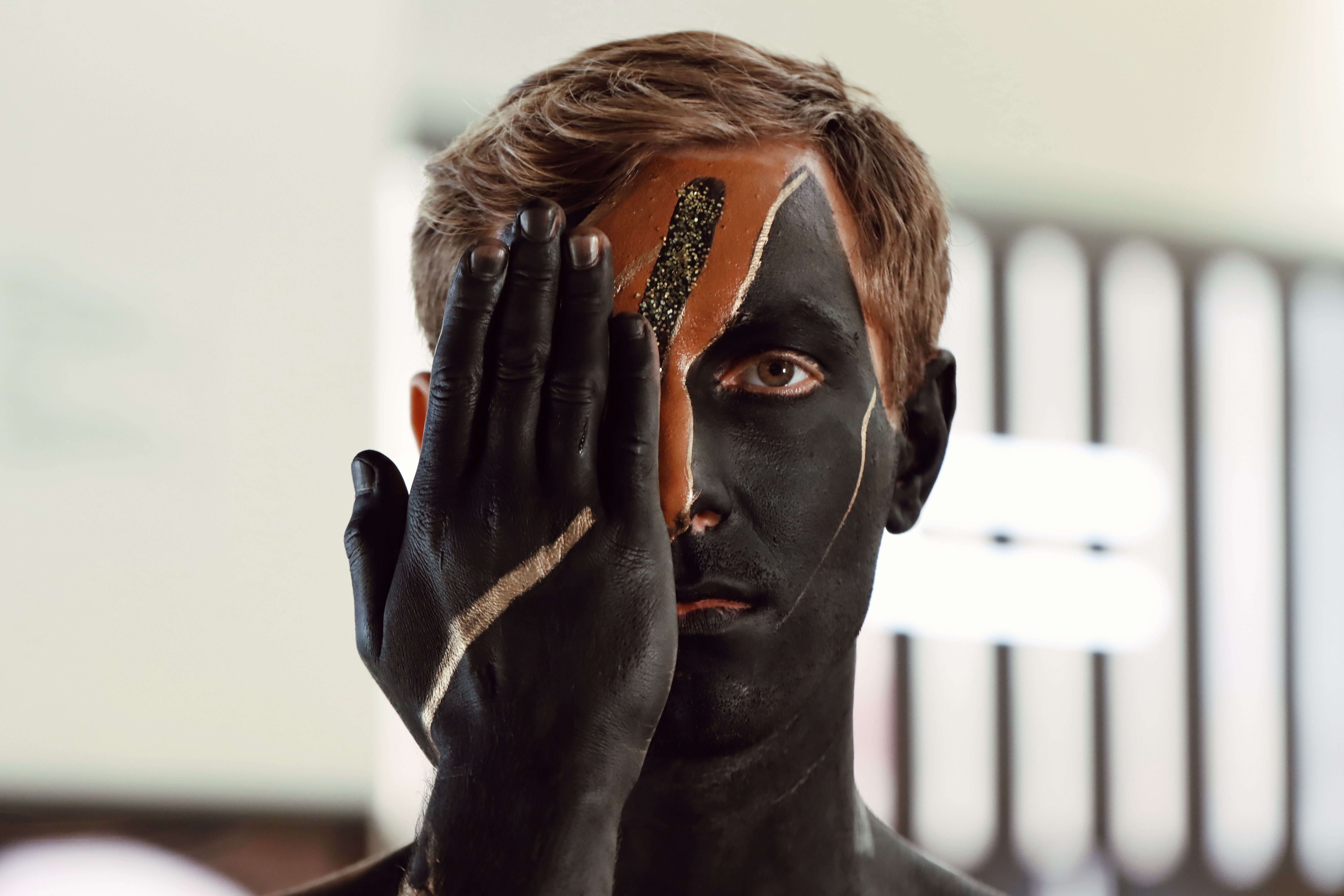 Artistic Portrait of Man with Face Paint in Athens · Free Stock Photo