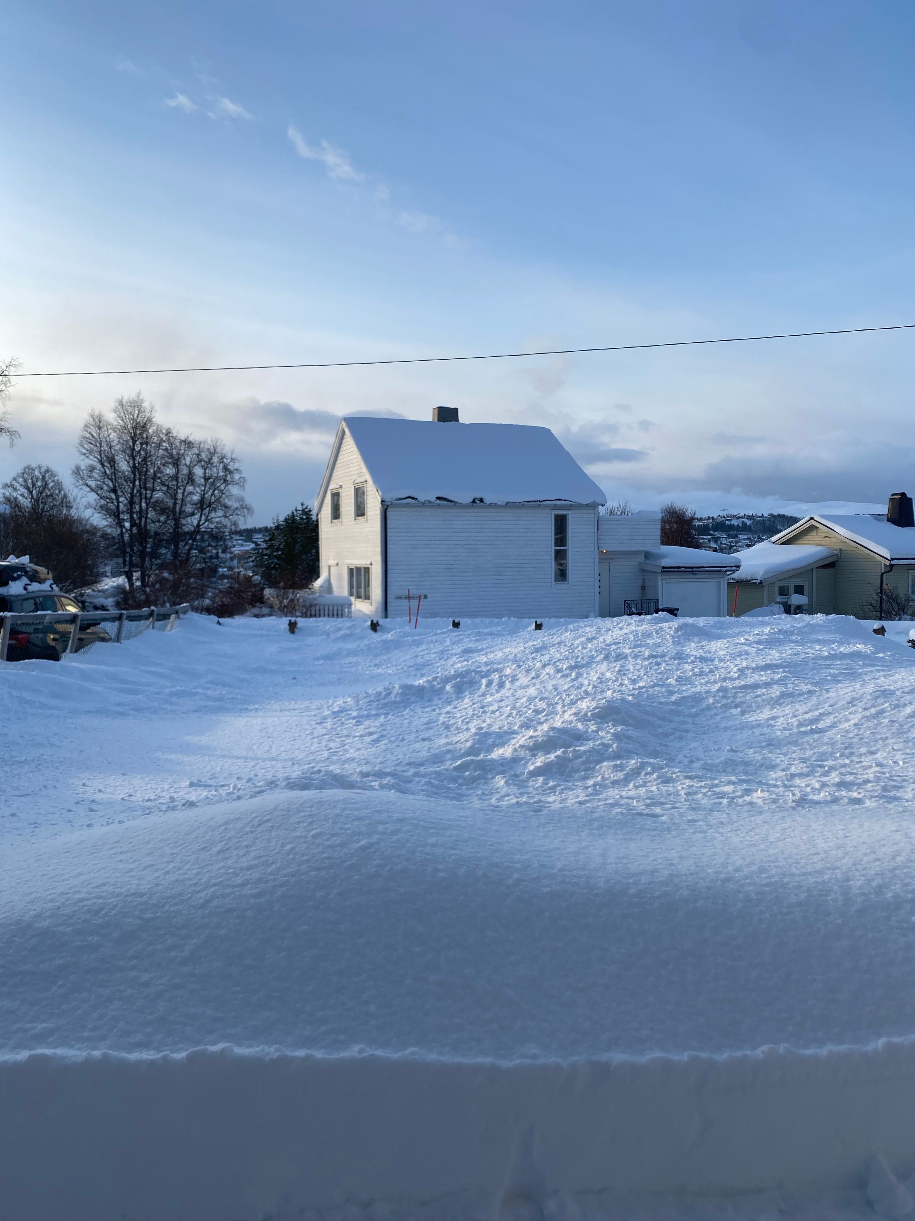 Snow-Covered House in Serene Winter Landscape · Free Stock Photo