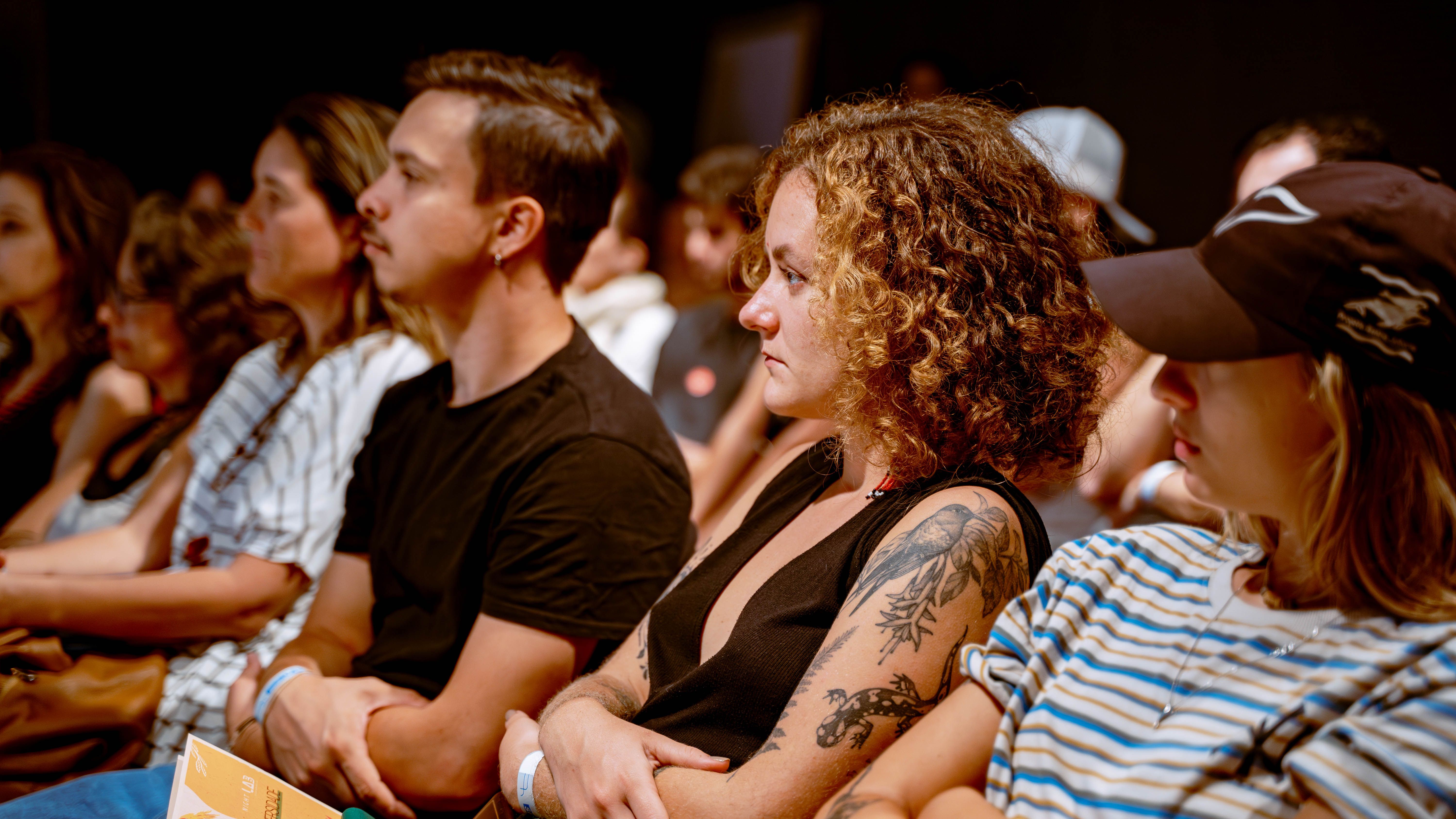 Engaged Audience at Seminar with Focused Attendees · Free Stock Photo
