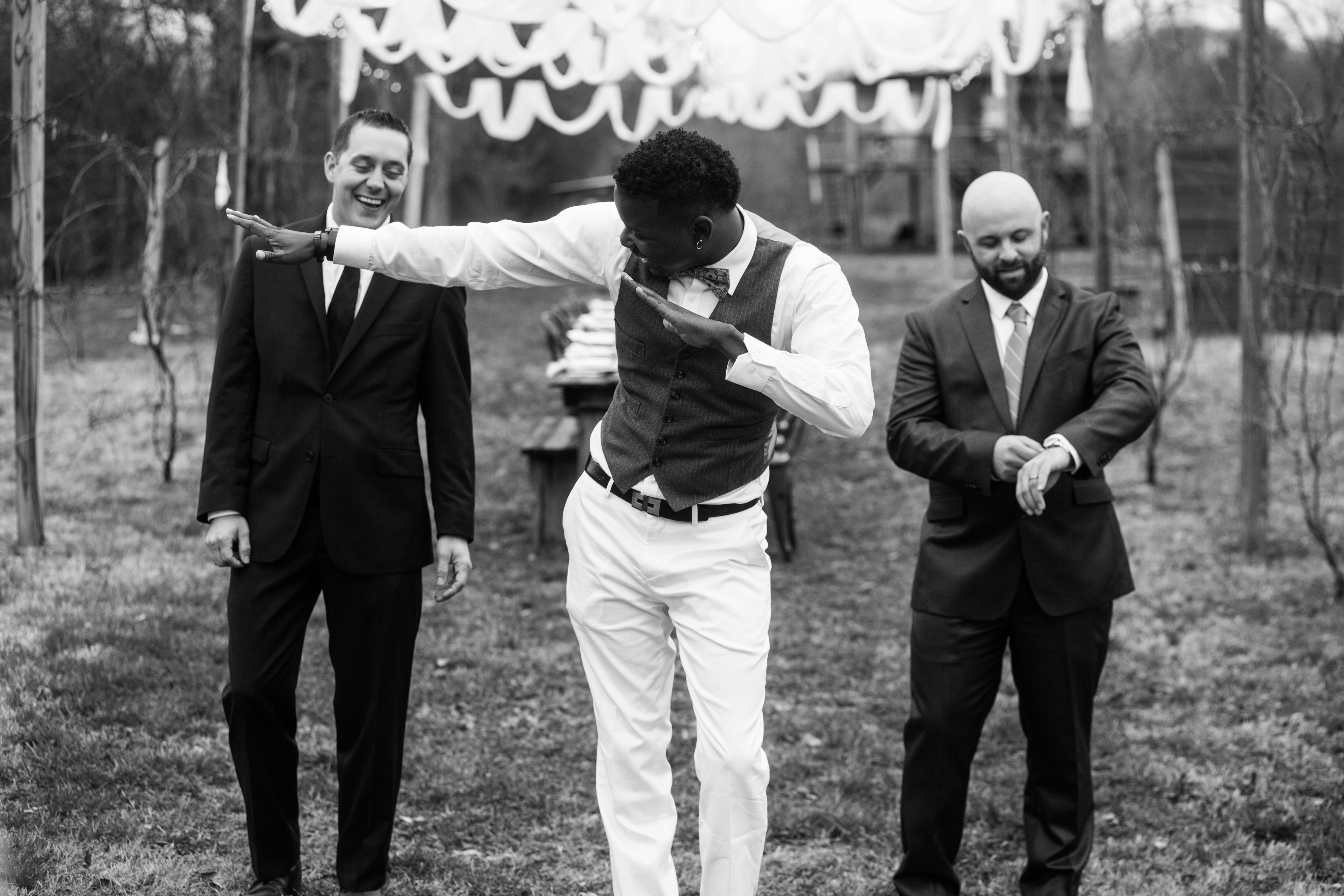 Fun Outdoor Event with Men in Formal Attire · Free Stock Photo